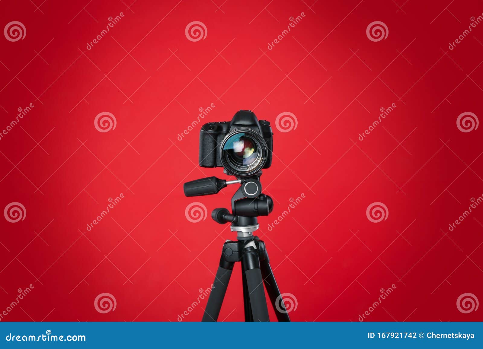 Modern Professional Video Camera on Red Background Stock Photo - Image ...