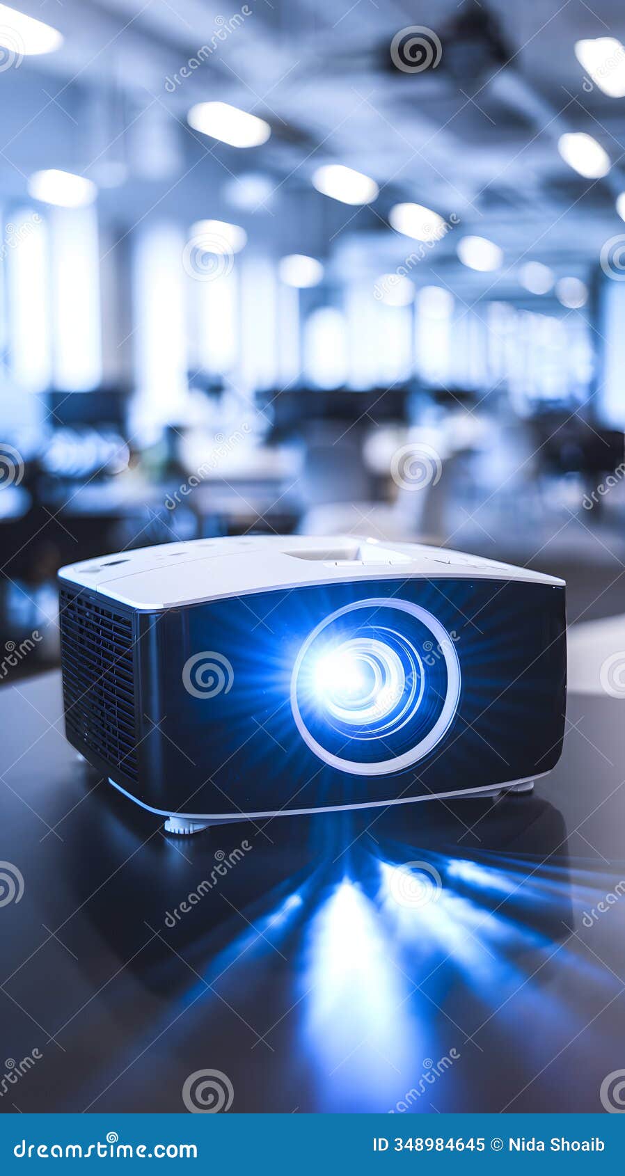 Modern Projector Emits Blue Light in Blurred Office, Ideal for ...