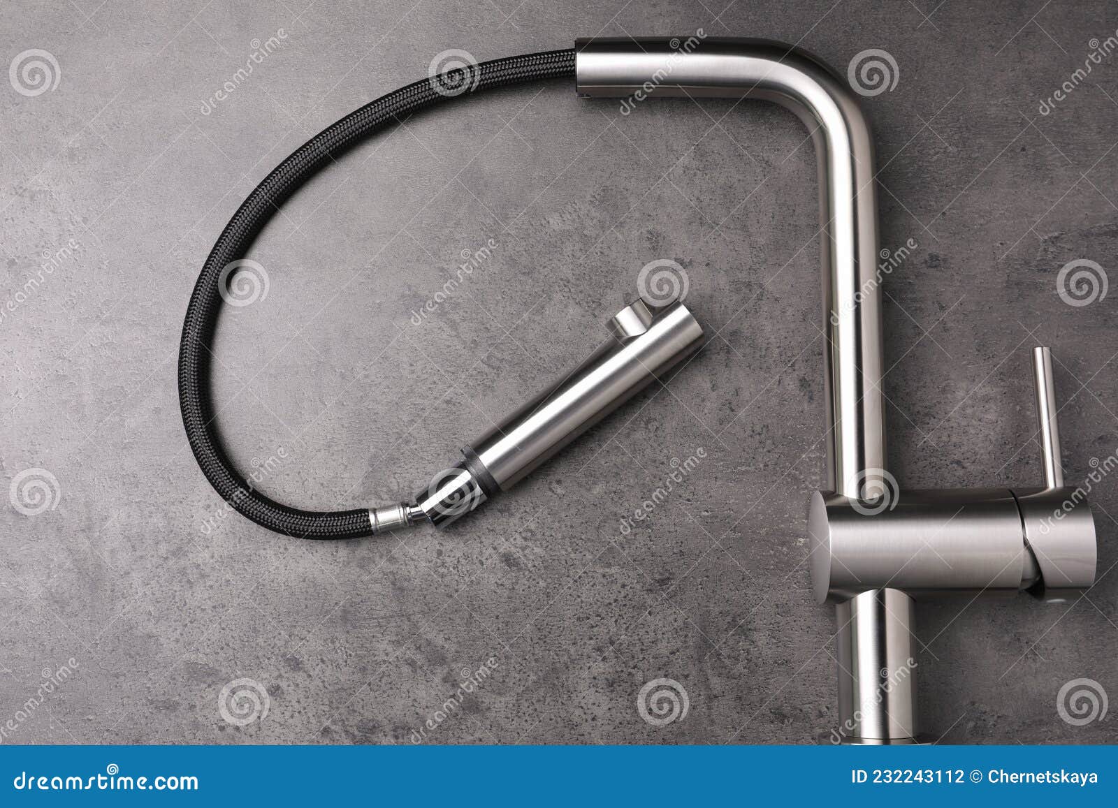 Modern Pull Out Kitchen Faucet on Grey Table, Top View Stock Photo ...