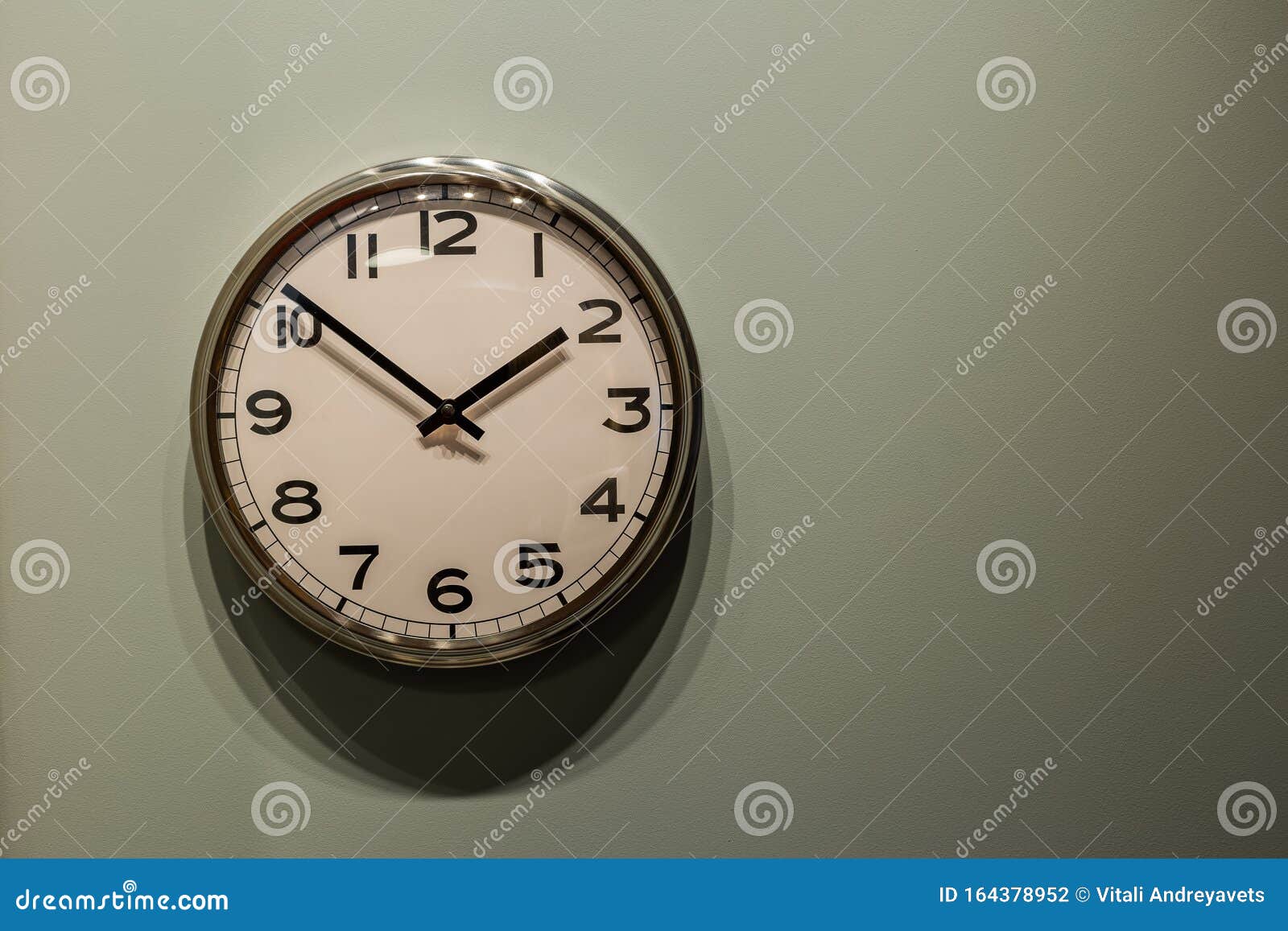 Modern Quartz Clock on a Painted Wall. Stock Photo - Image of object ...