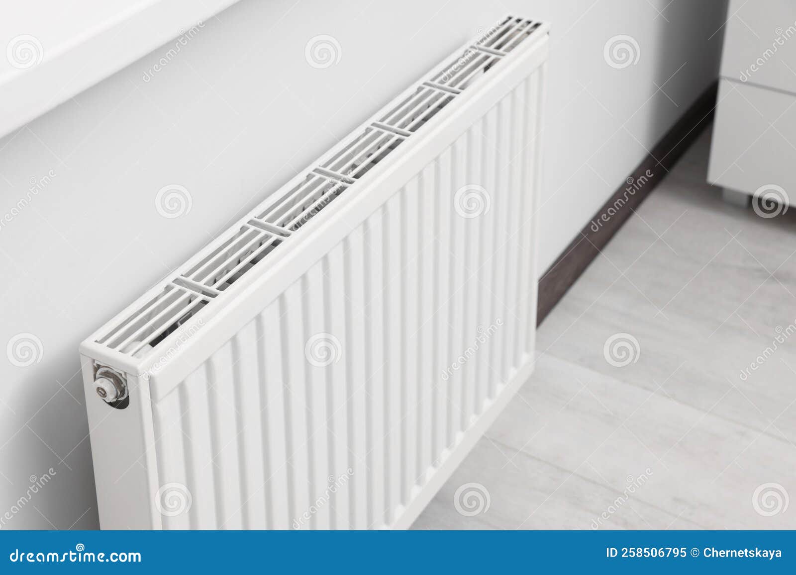 Modern Radiator on White Wall in Room. Central Heating System Stock ...