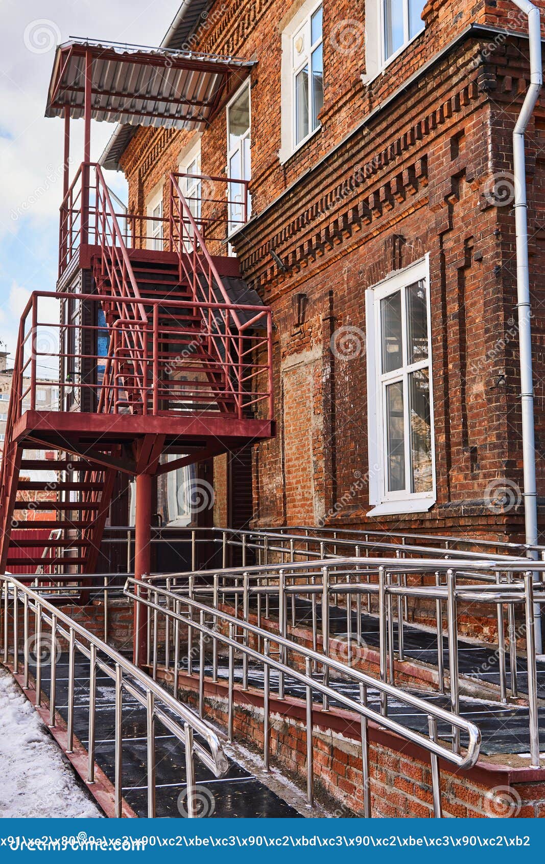 Modern Ramp for the Disabled and Fire Escape Attached To the Old ...