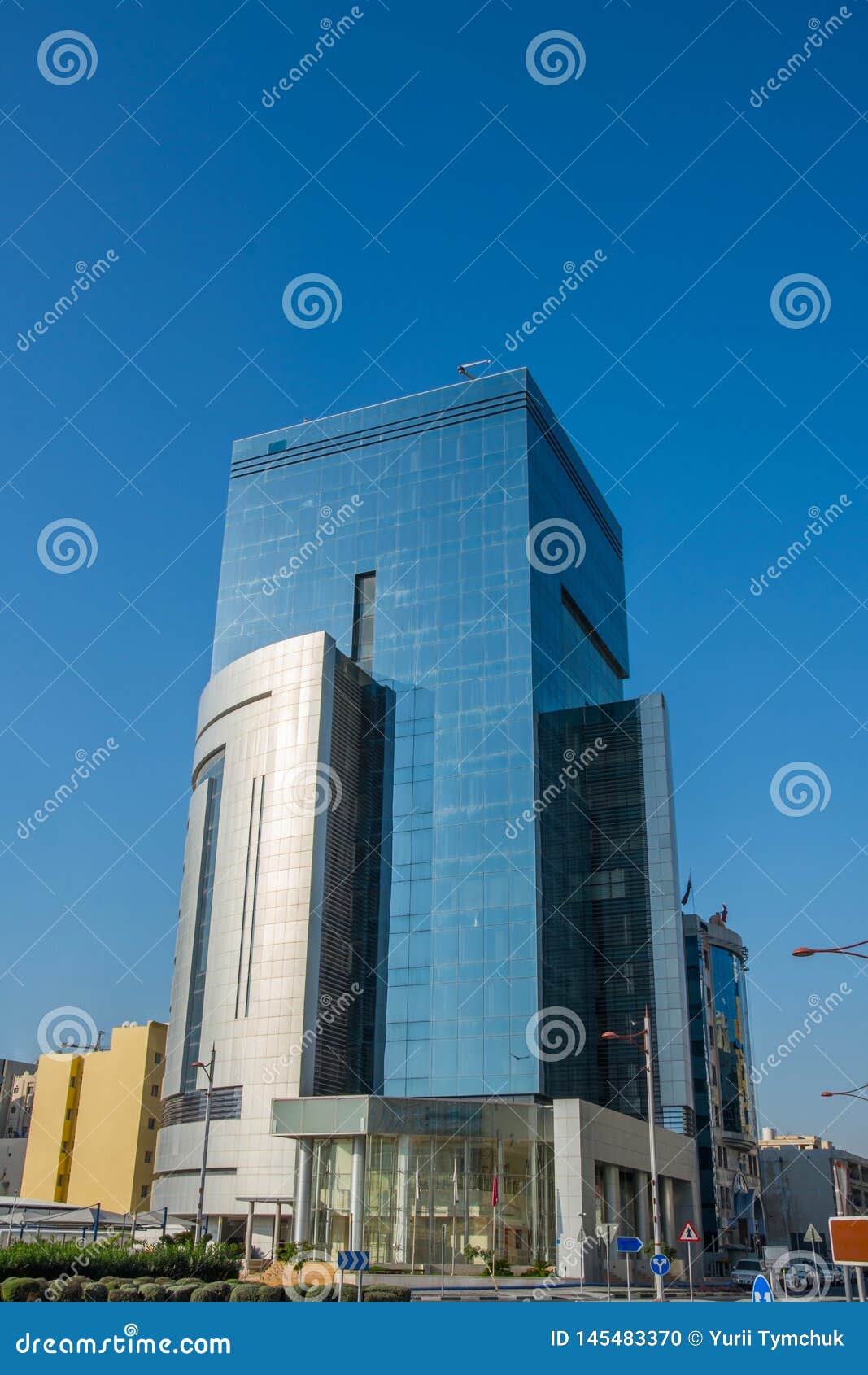 Modern Rectangular Building with Glassed Facade at the Street Stock ...