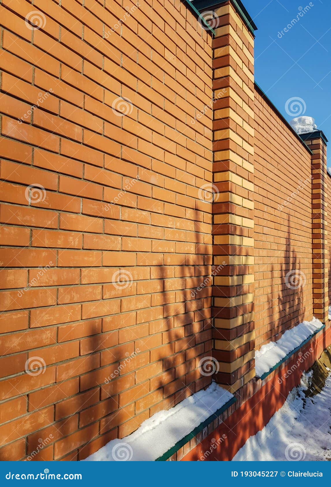 Modern Red Brick Fence with Turrets, in Winter, Outdoors Stock Image ...