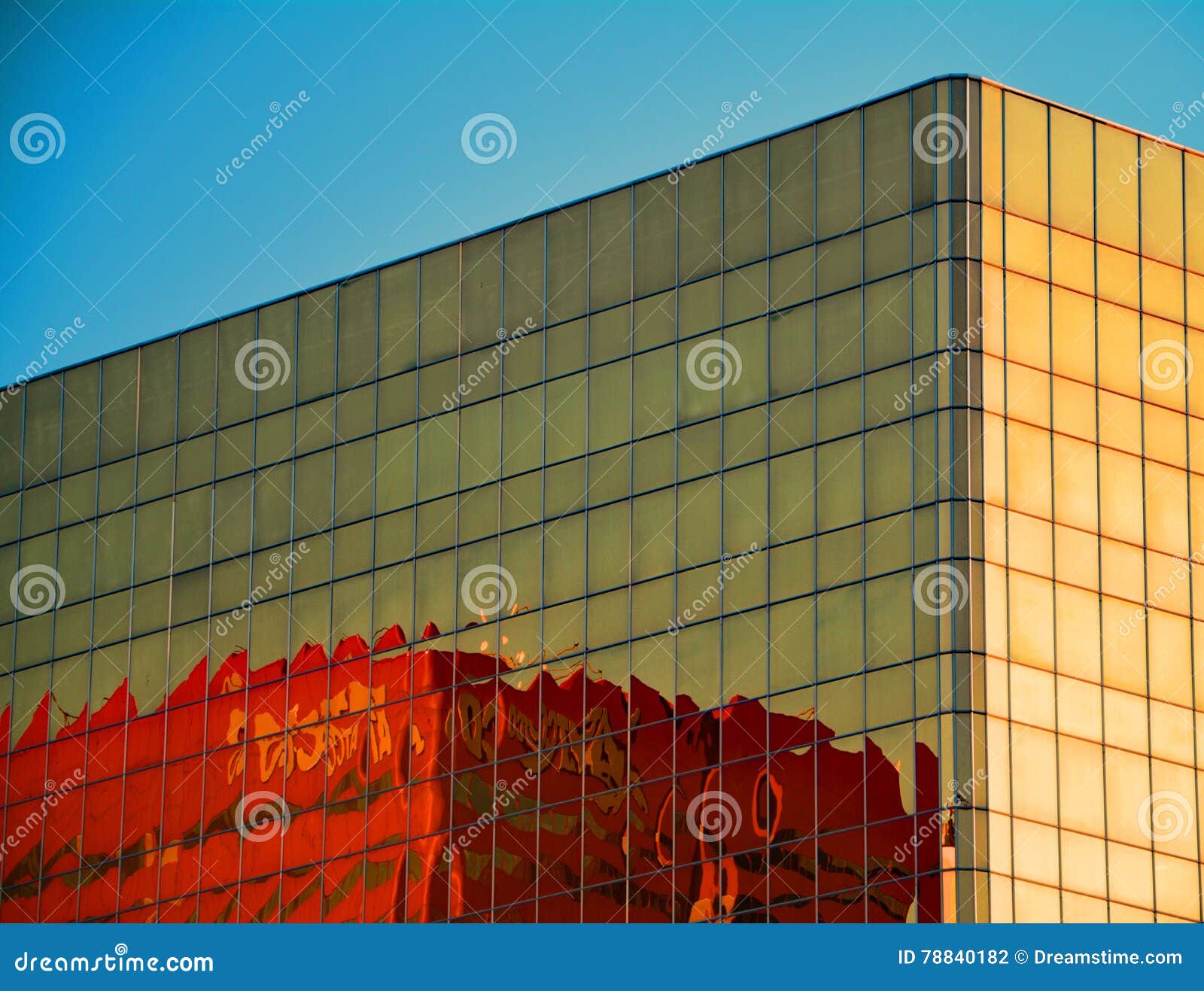 Modern Red Building Reflected in Golden Building Stock Photo - Image of ...