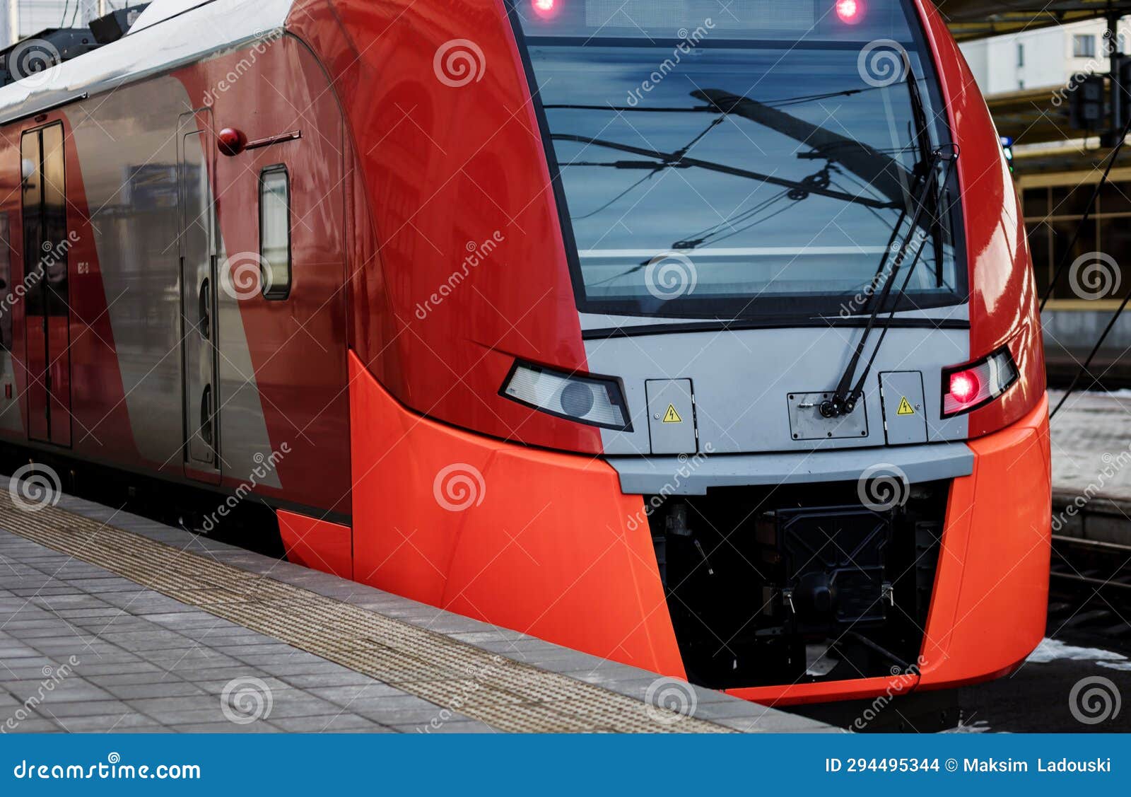 Modern red commuter train stock photo. Image of locomotive - 294495344
