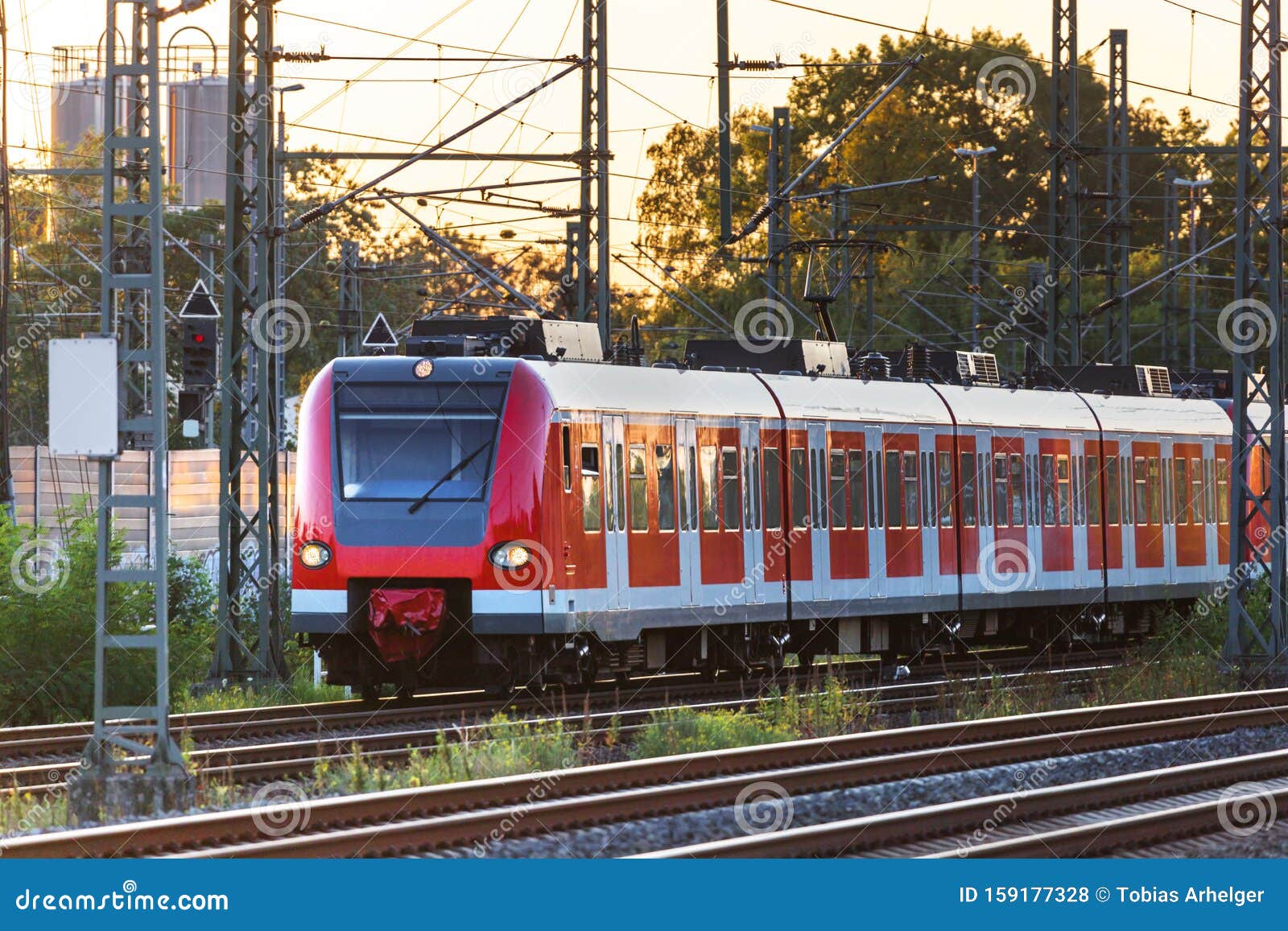Modern Red Passenger Train in the Evening Stock Photo - Image of ...