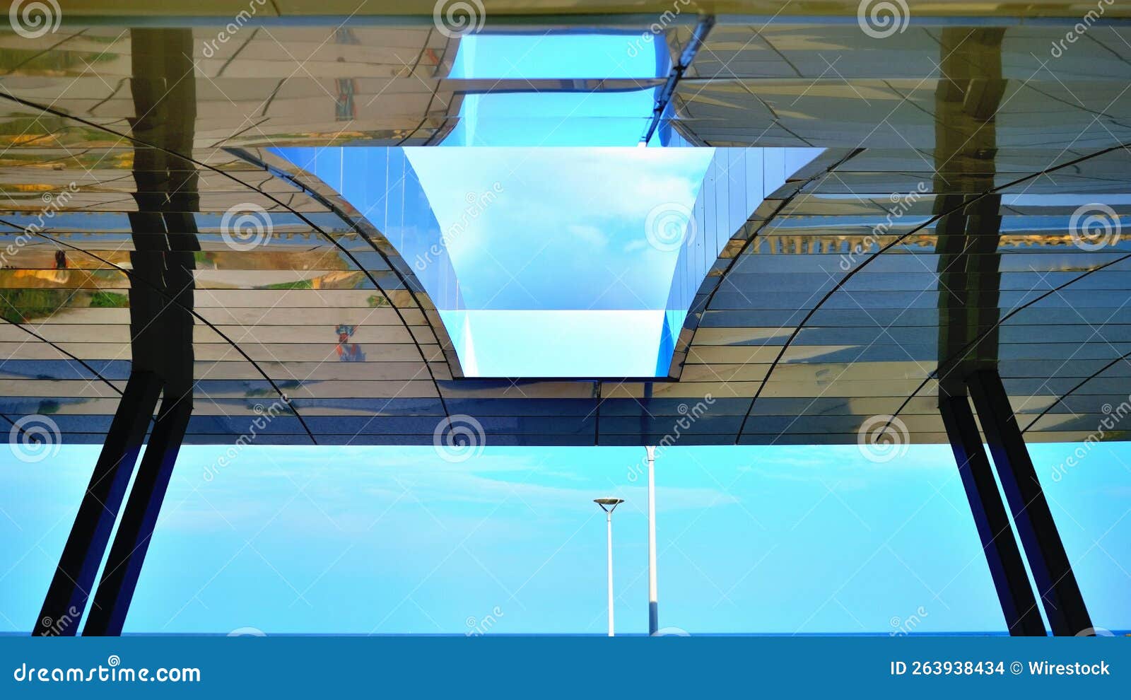 Modern, Reflective Glass Building with a Huge Window Displaying the ...