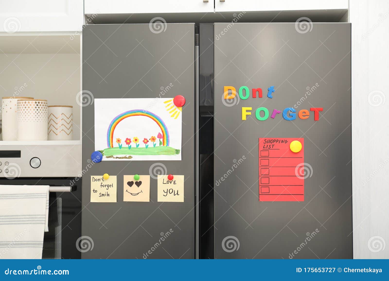 Modern Refrigerator with Child`s Drawing, Notes and Magnets Stock ...