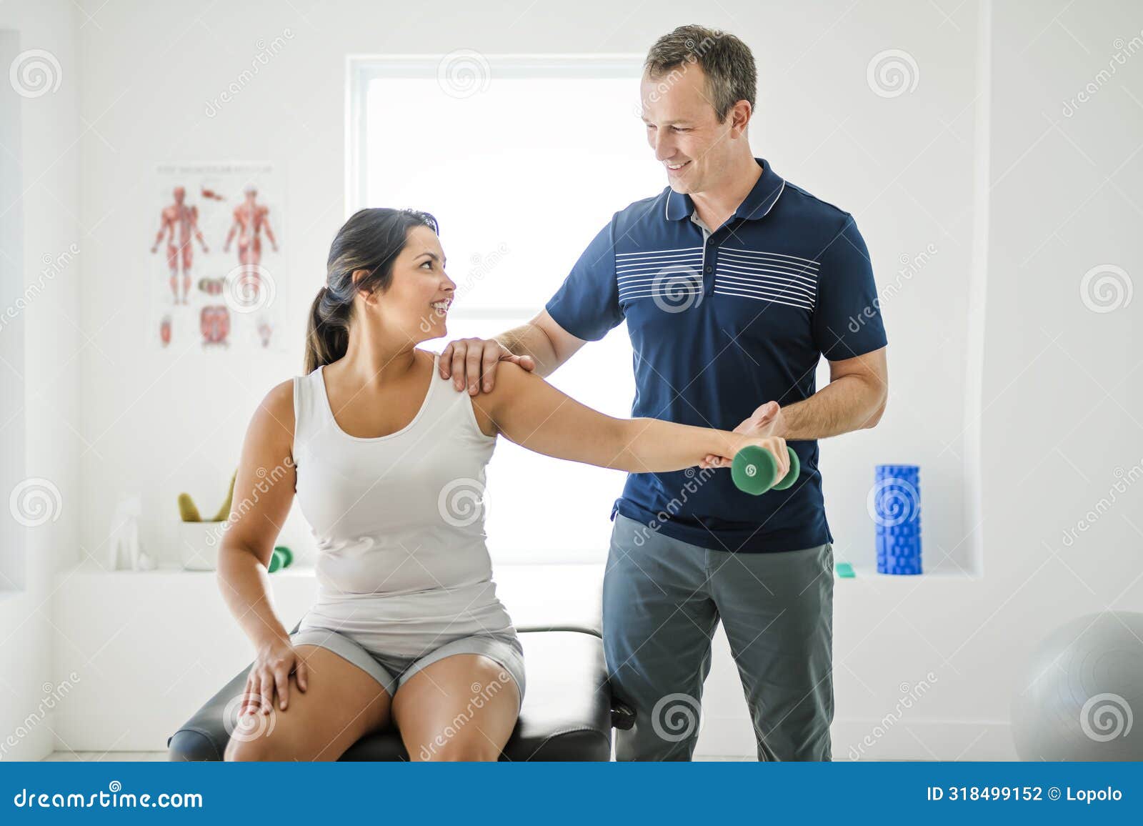 Modern Rehabilitation Physiotherapy Man at Work with Woman Client Stock Photo - Image of ...