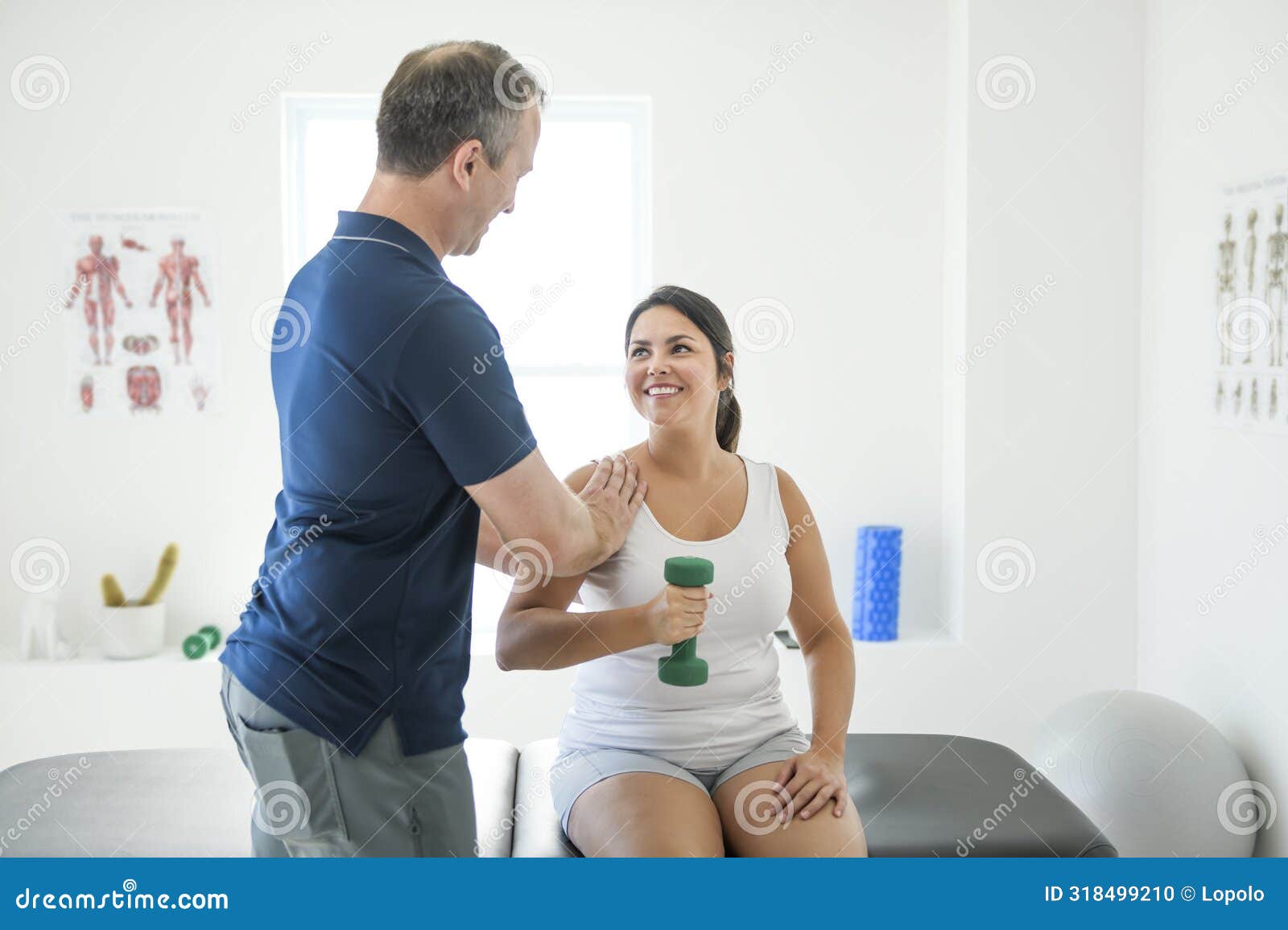 Modern Rehabilitation Physiotherapy Man at Work with Woman Client Stock Photo - Image of ...