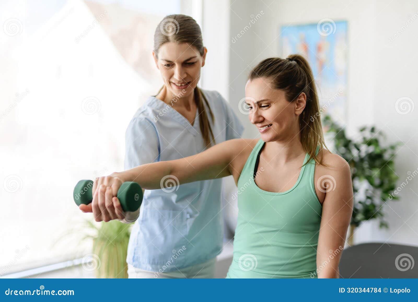 Modern Rehabilitation Physiotherapy Woman Worker with Woman Client ...