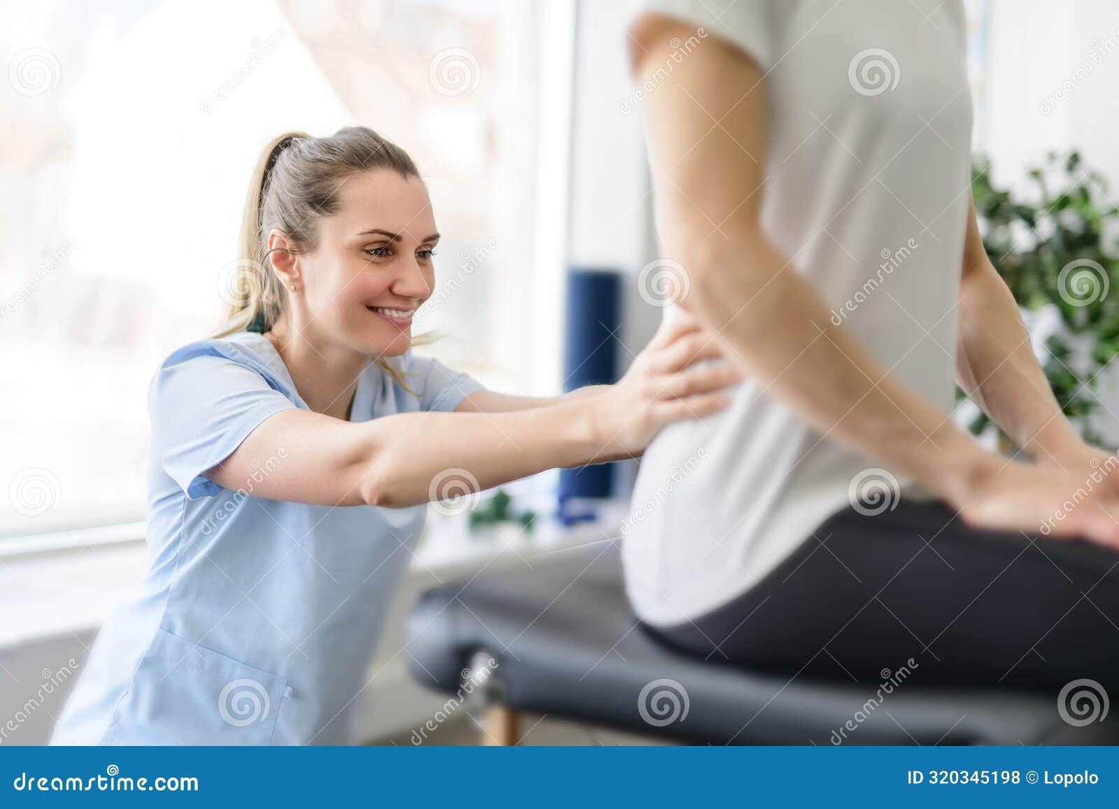 Modern Rehabilitation Physiotherapy Woman Worker with Woman Client ...
