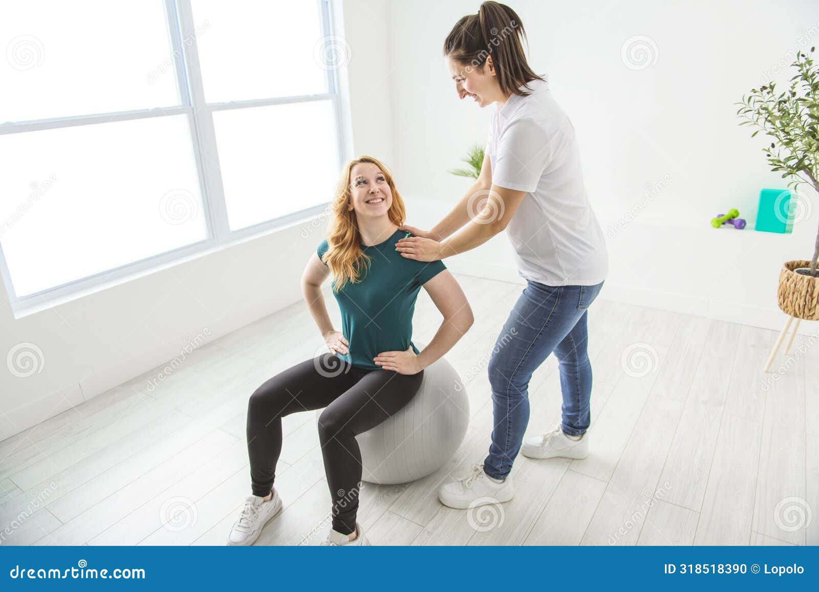 Modern Rehabilitation Physiotherapy at Work with Client Using Training ...