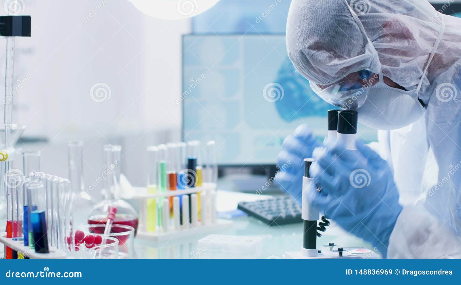 In Modern Research Center a Scientist is Working on the Computer Stock ...