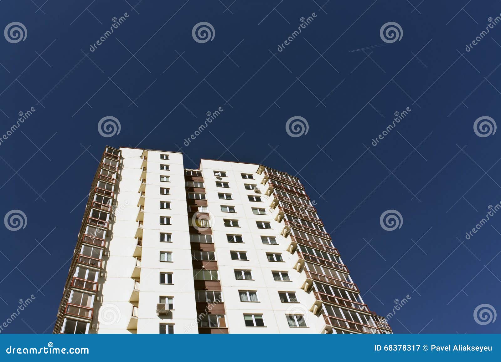Modern Residential Building and Plane Trace in the Sky. Stock Image ...