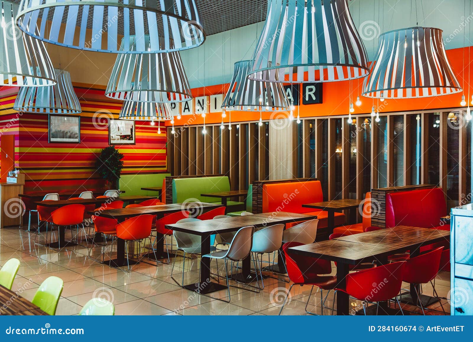 Modern Restaurant Interior with Bright Red and Green Design Stock Photo ...