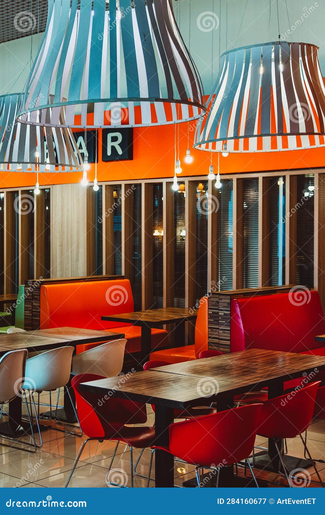 Modern Restaurant Interior with Bright Red and Green Design Stock Image ...