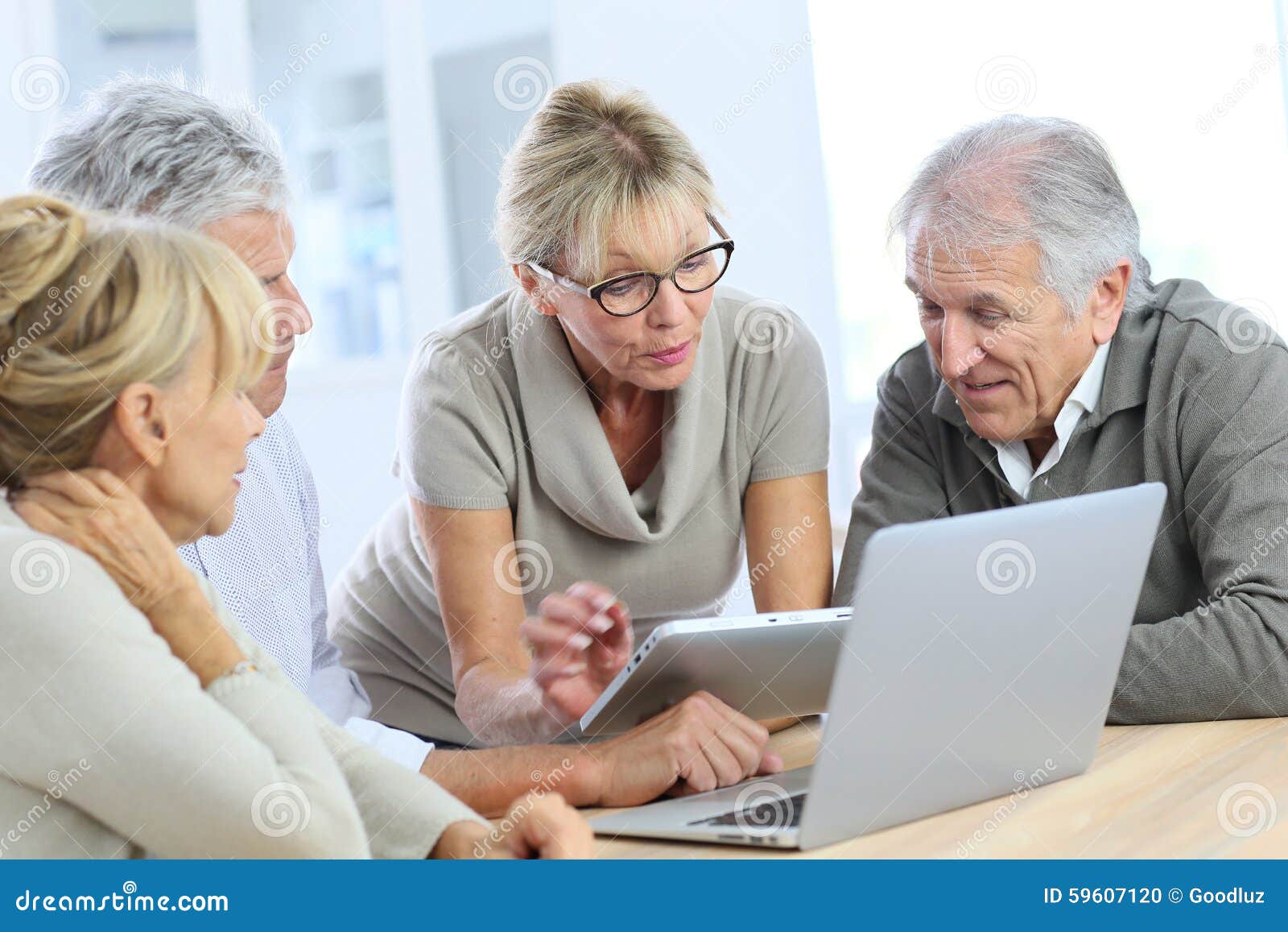 Modern Retired People on Tablet and Laptop Stock Photo - Image of ...
