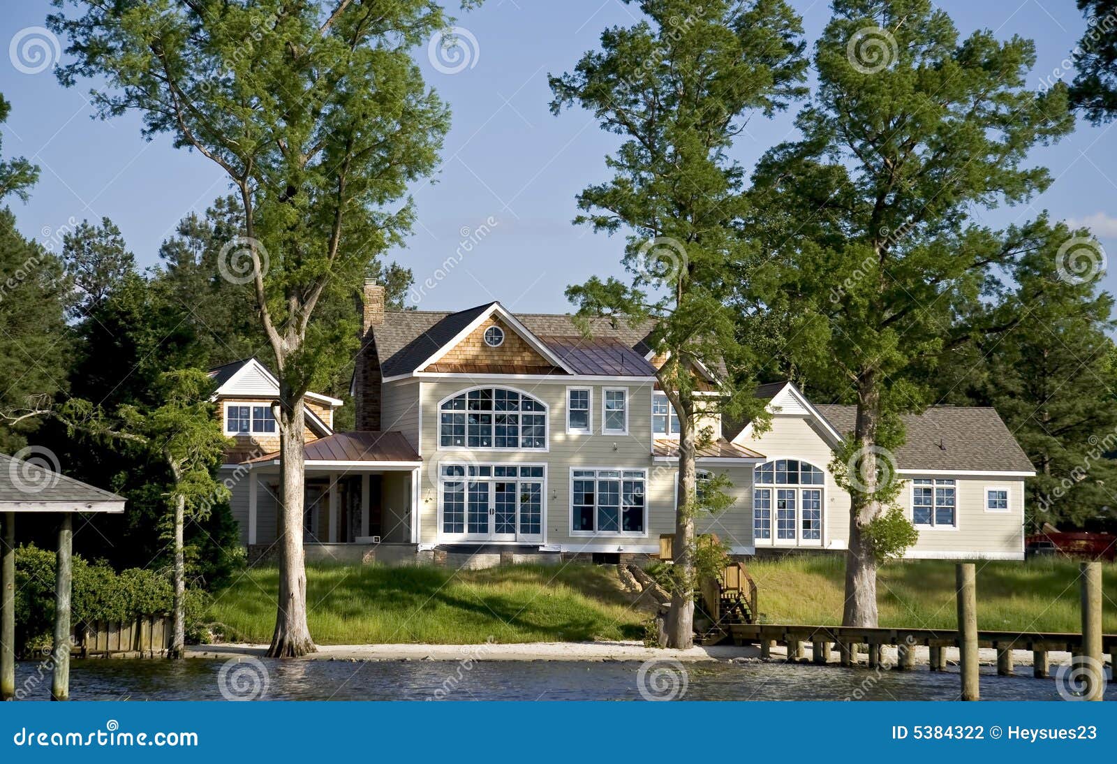 Modern river front home stock photo. Image of dwelling - 5384322