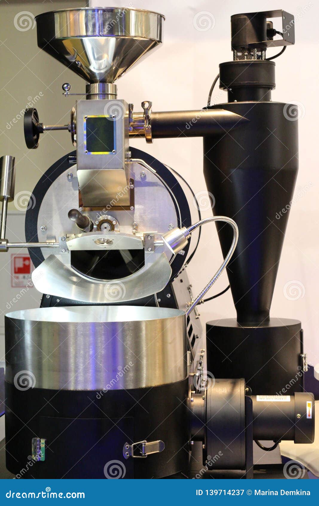 Modern Roasters for Roasting Coffee. Roasting is Completed with a ...