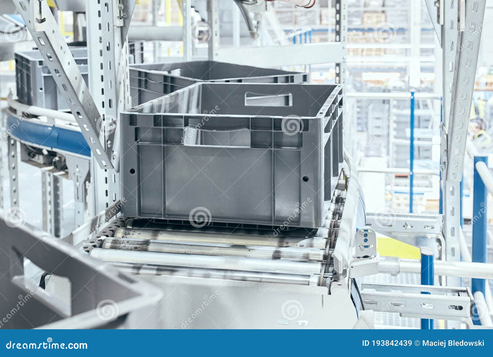 Modern Roller Conveyor System with Plastic Boxes Stock Image - Image of ...