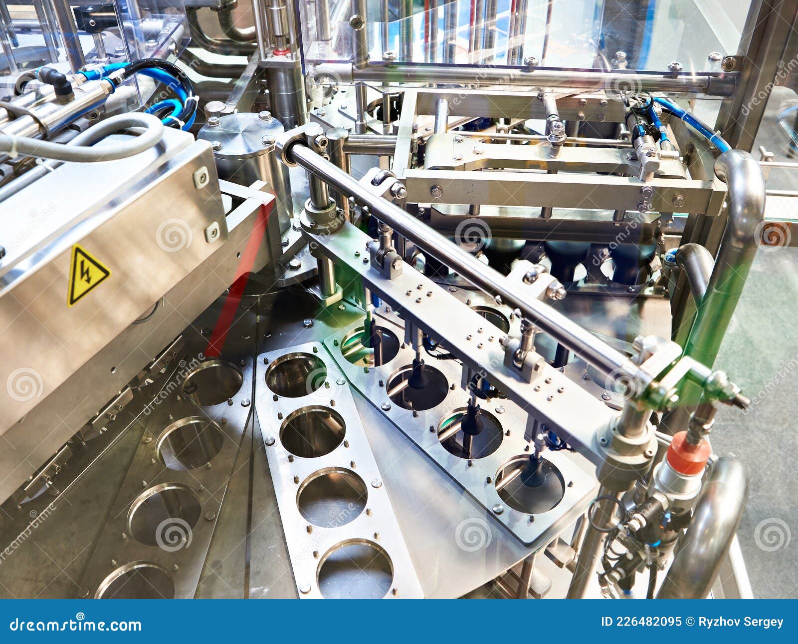 Rotary Filling and Packaging Machine Industrial Stock Image - Image of ...