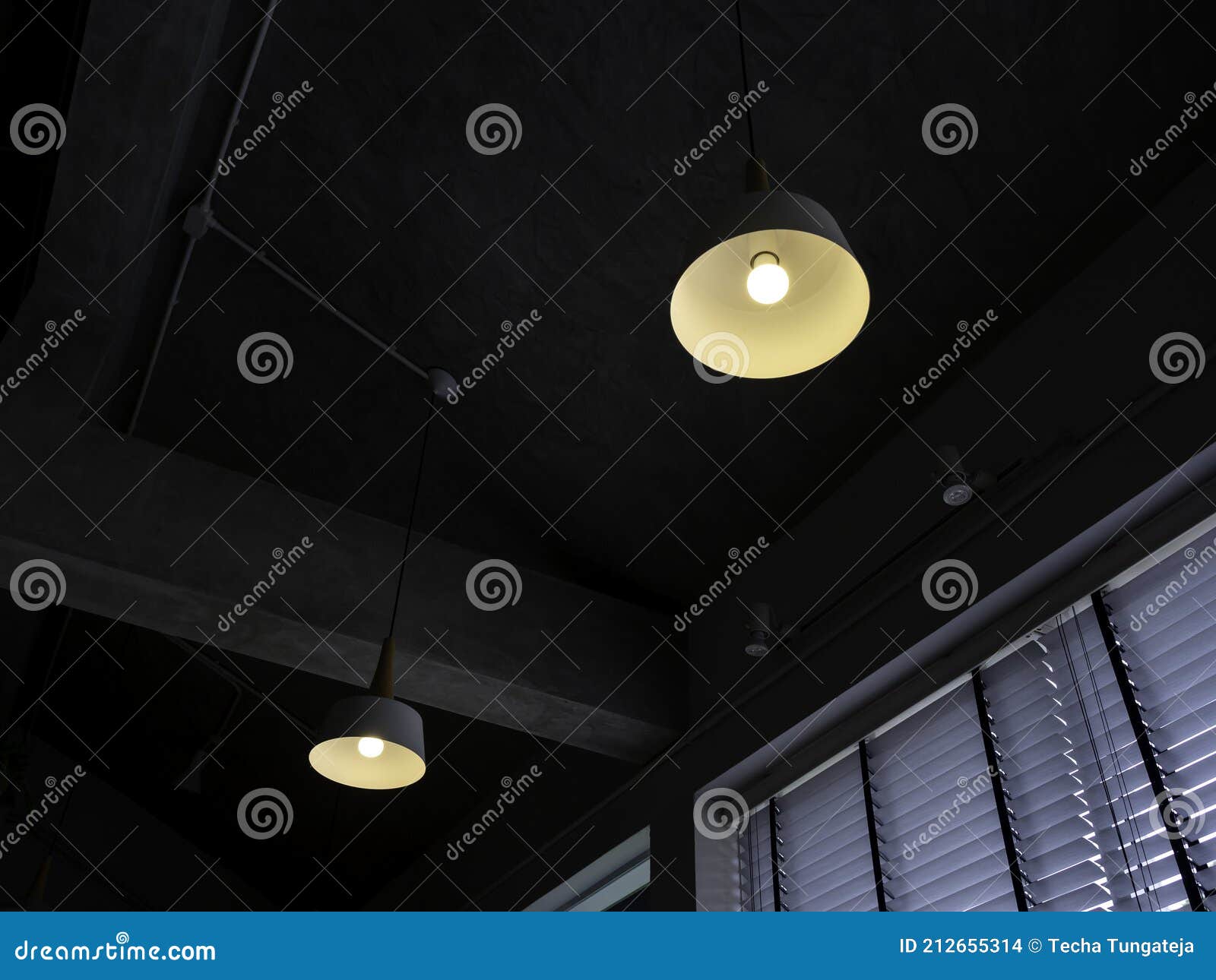 Modern Round Ceiling Light with Light Bulb Hanging from Concrete ...