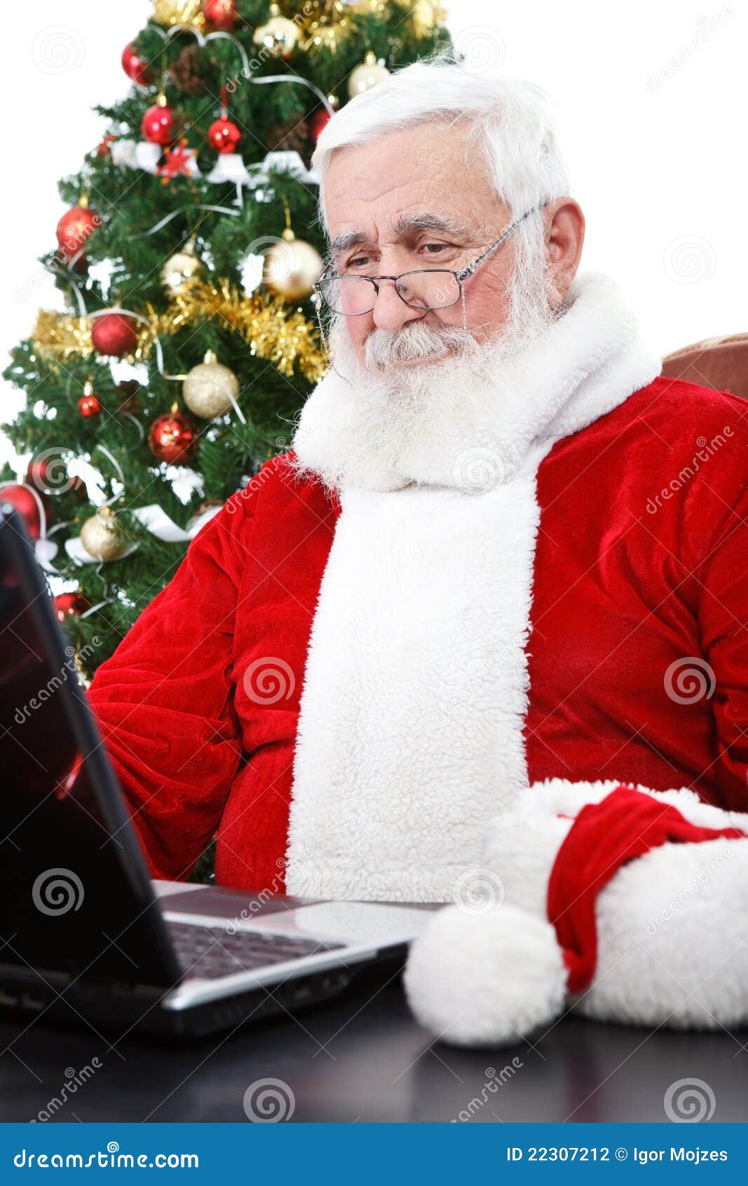 Modern Santa using laptop stock photo. Image of modern - 22307212