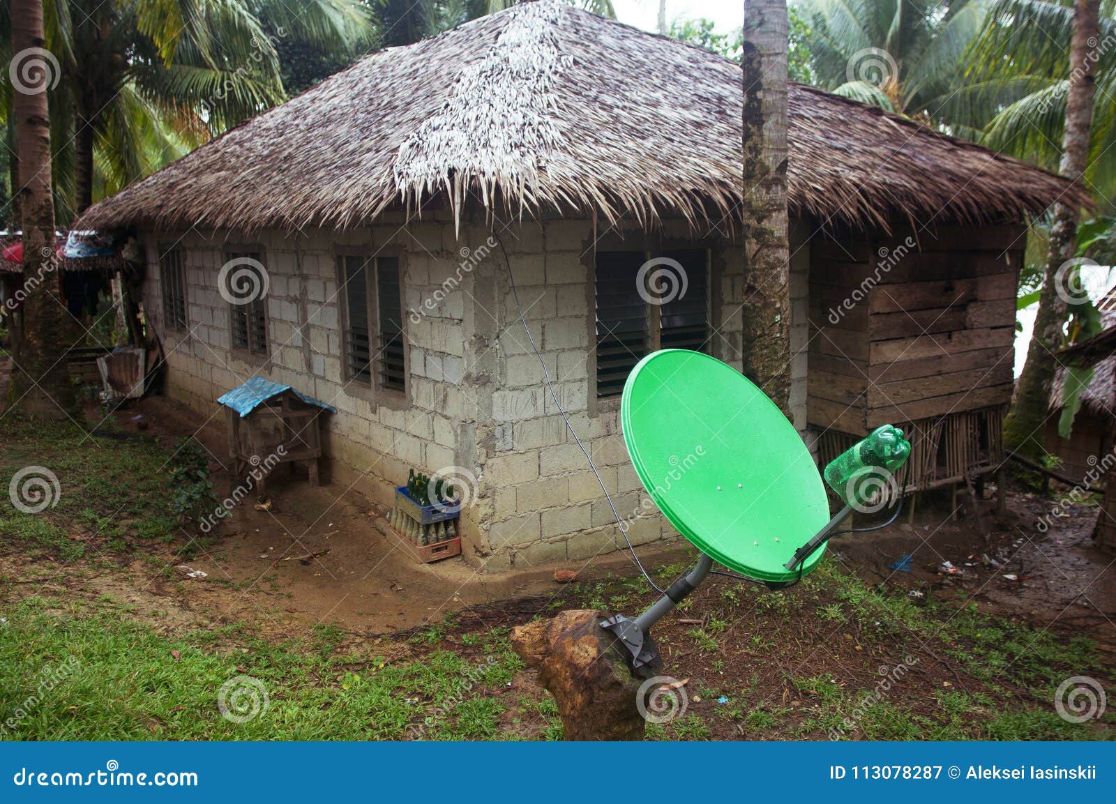 Modern Satellite Dish Next To the Shack among the Palm Trees ...