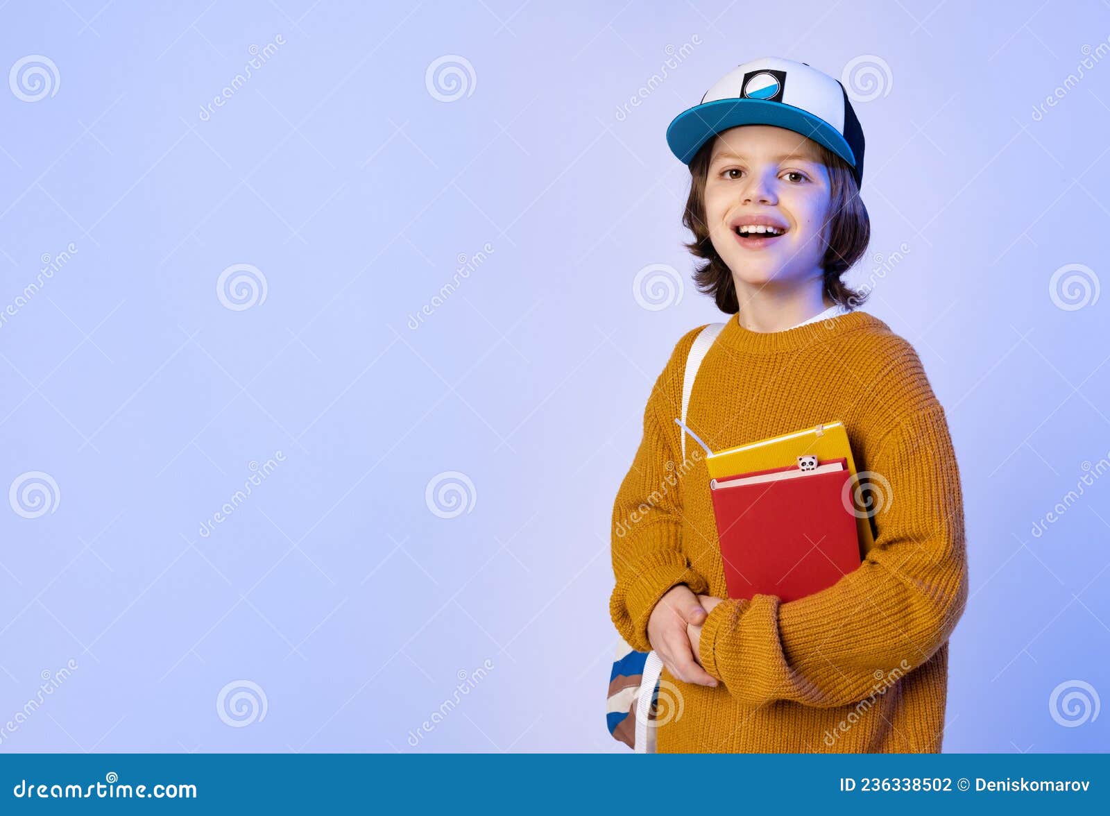 Modern School Child Smiling with Backpack and Books Stock Photo - Image ...