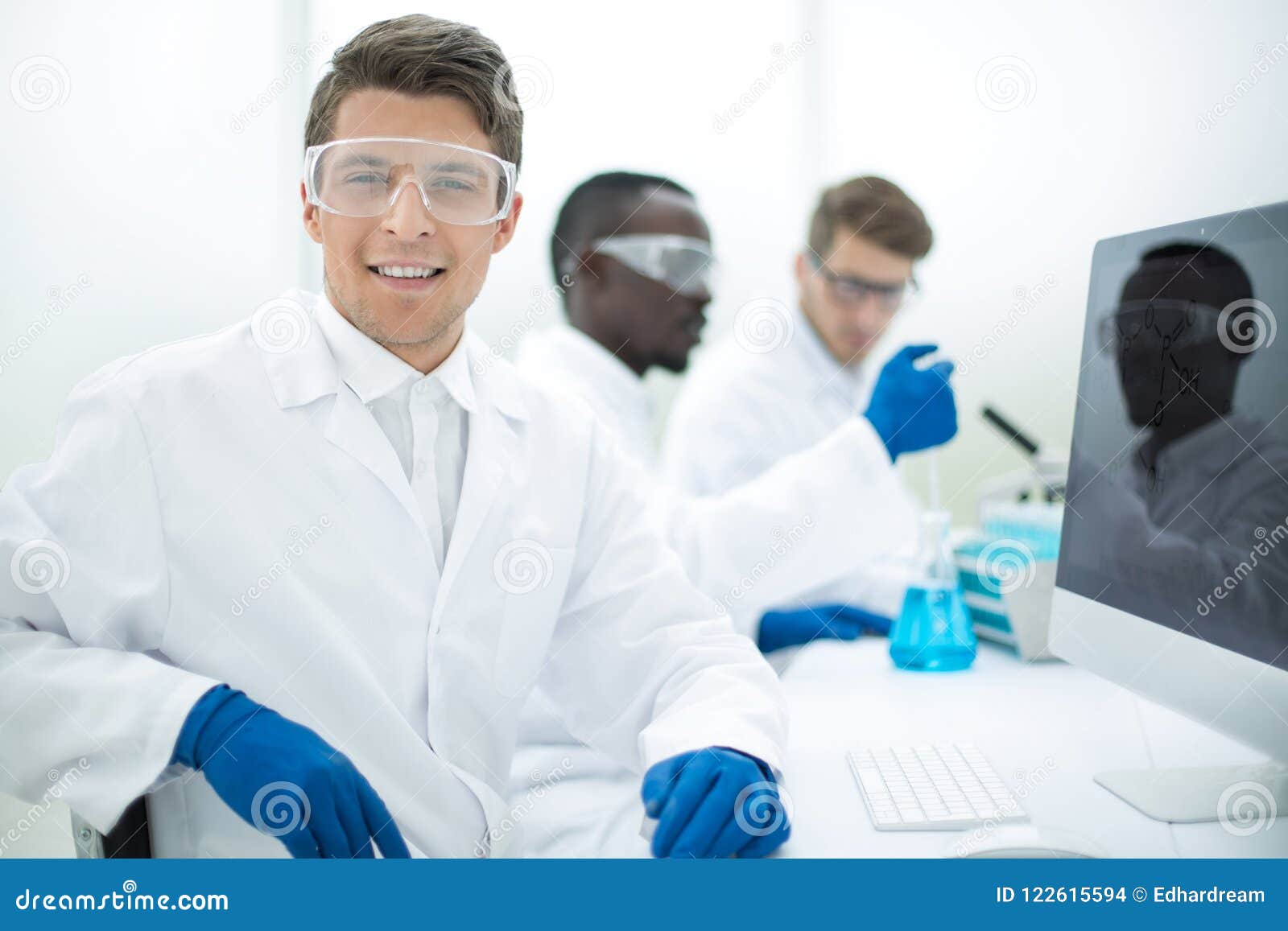 Modern Scientist Sitting in Front of a Computer Monito Stock Photo ...