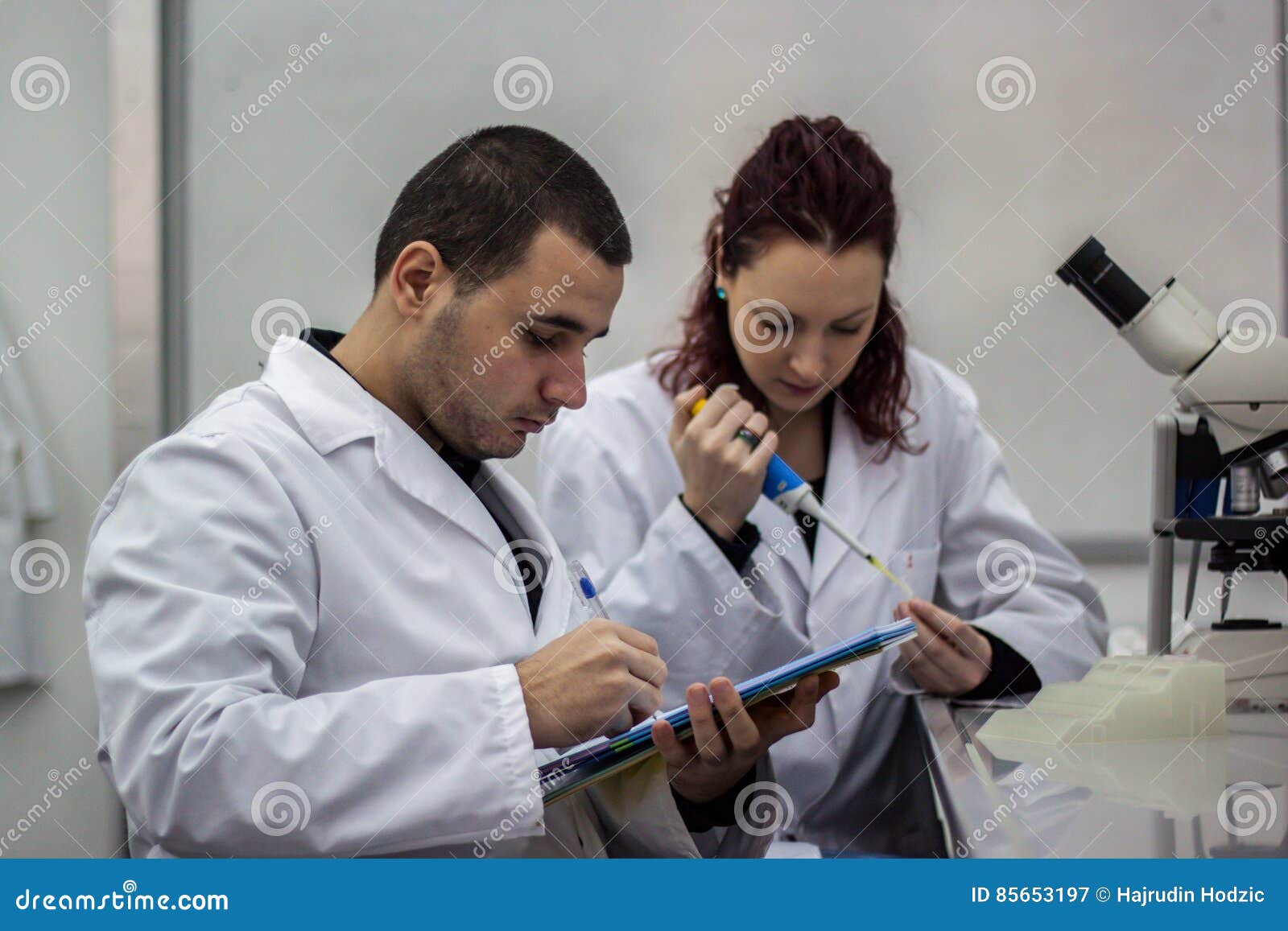 Modern Scientist Working with Pipette in Biotechnology Laboratory ...