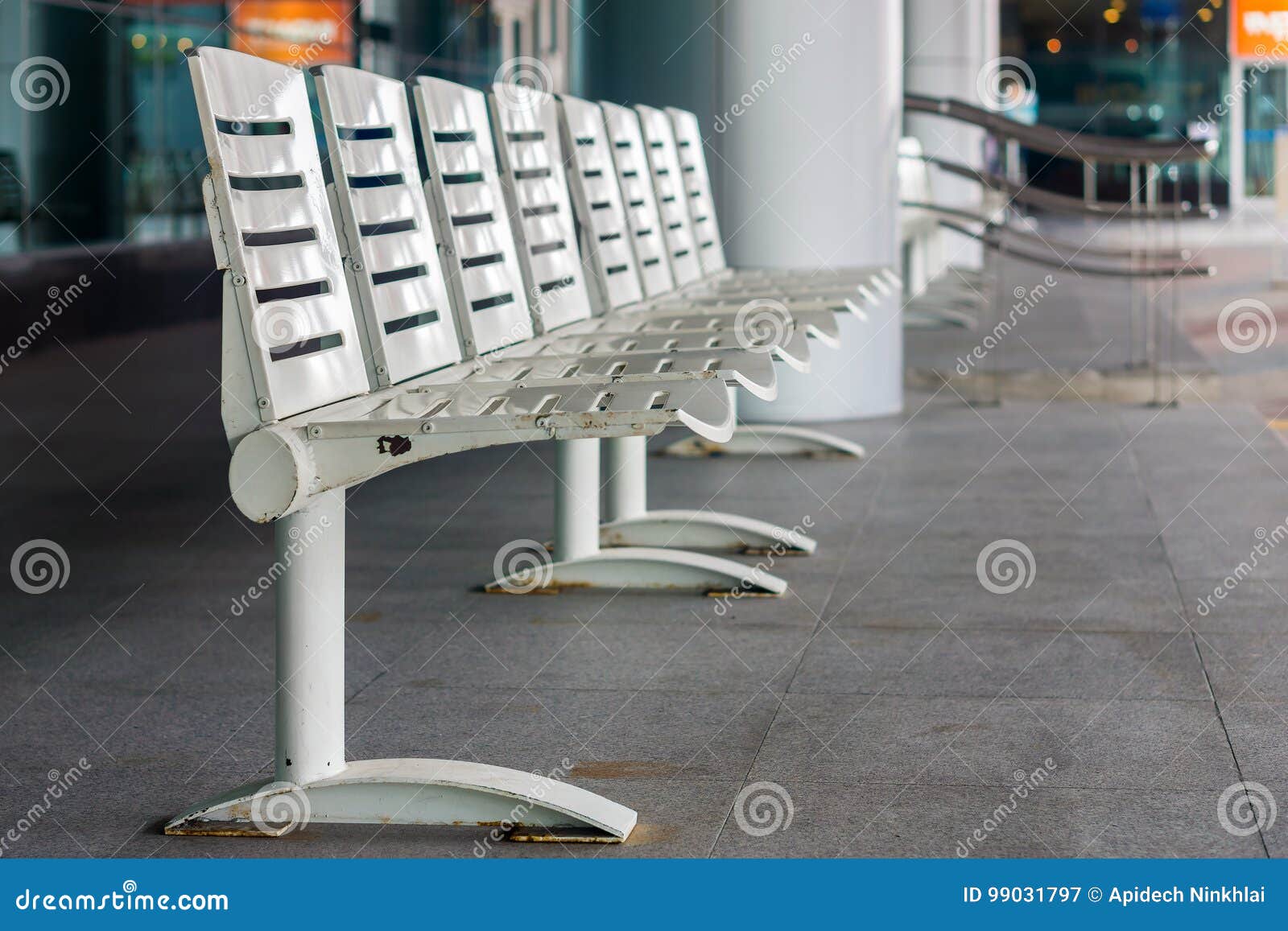 Modern seating at bus stop stock image. Image of frame - 99031797
