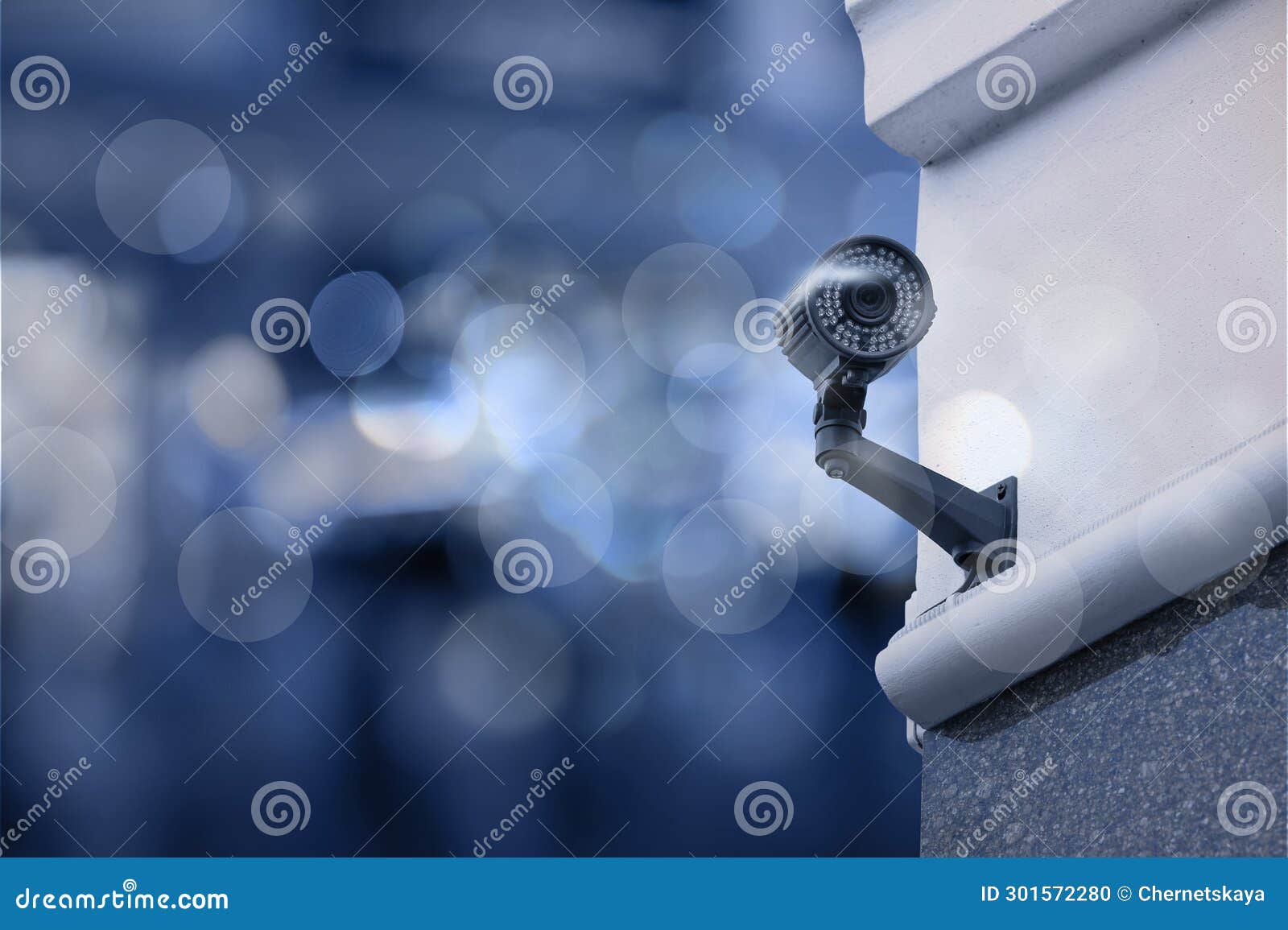 Modern Security CCTV Camera on Building Wall Outdoors, Space for Text ...