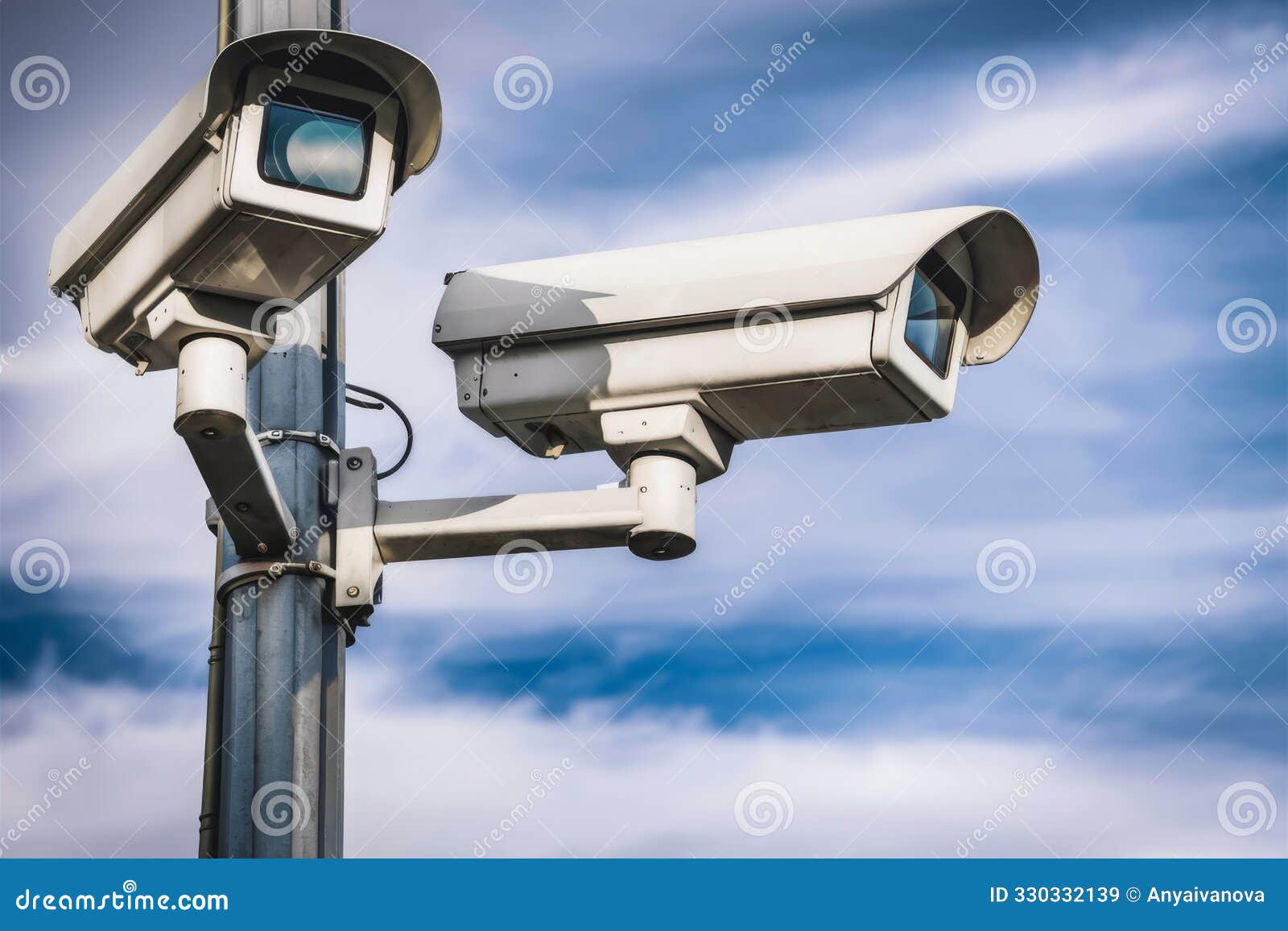 Modern Security Surveillance Cameras on Street Lamp Post with Blue Sky ...