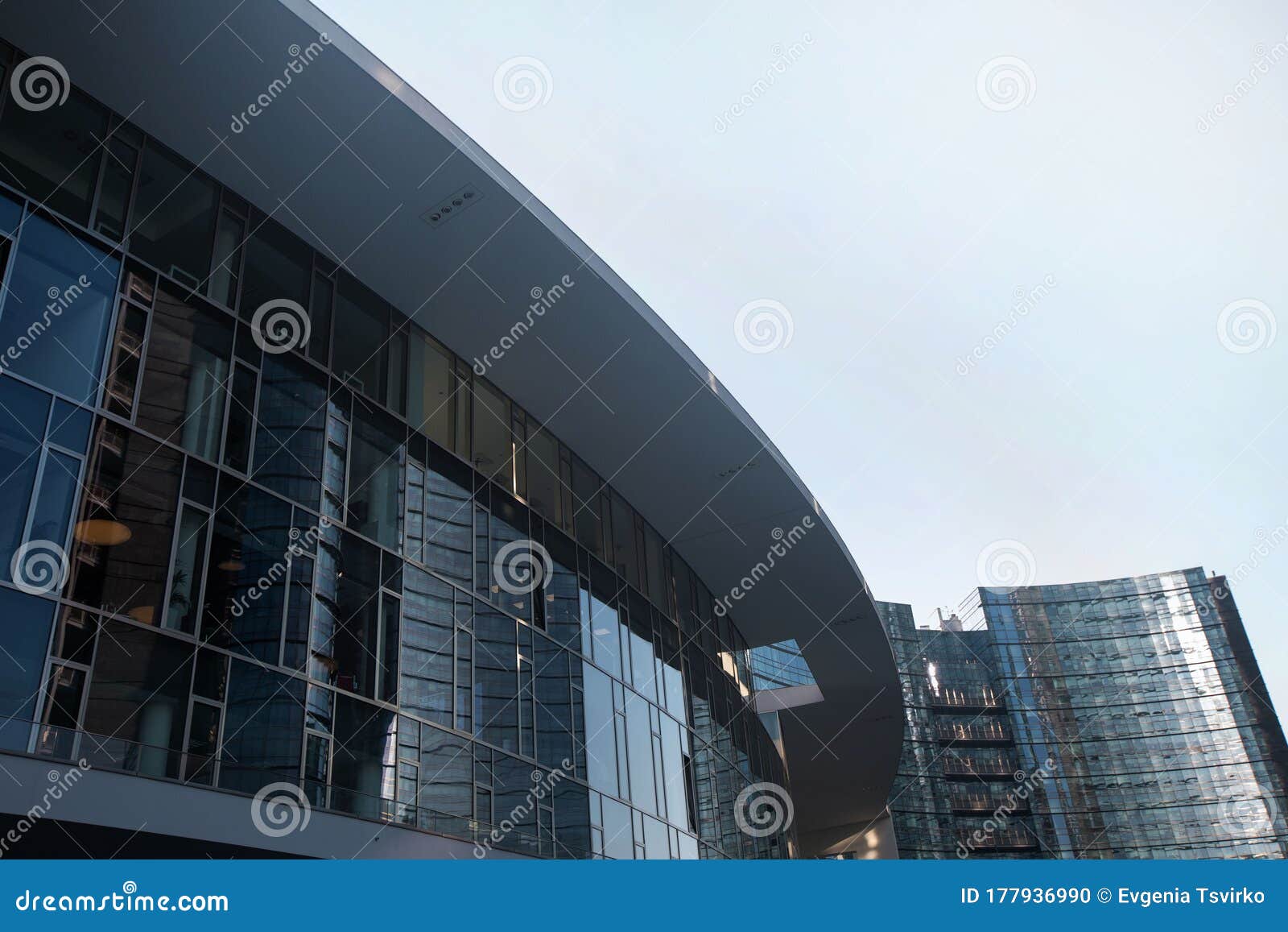A Modern Semicircular Building with Windows Throughout the Building ...