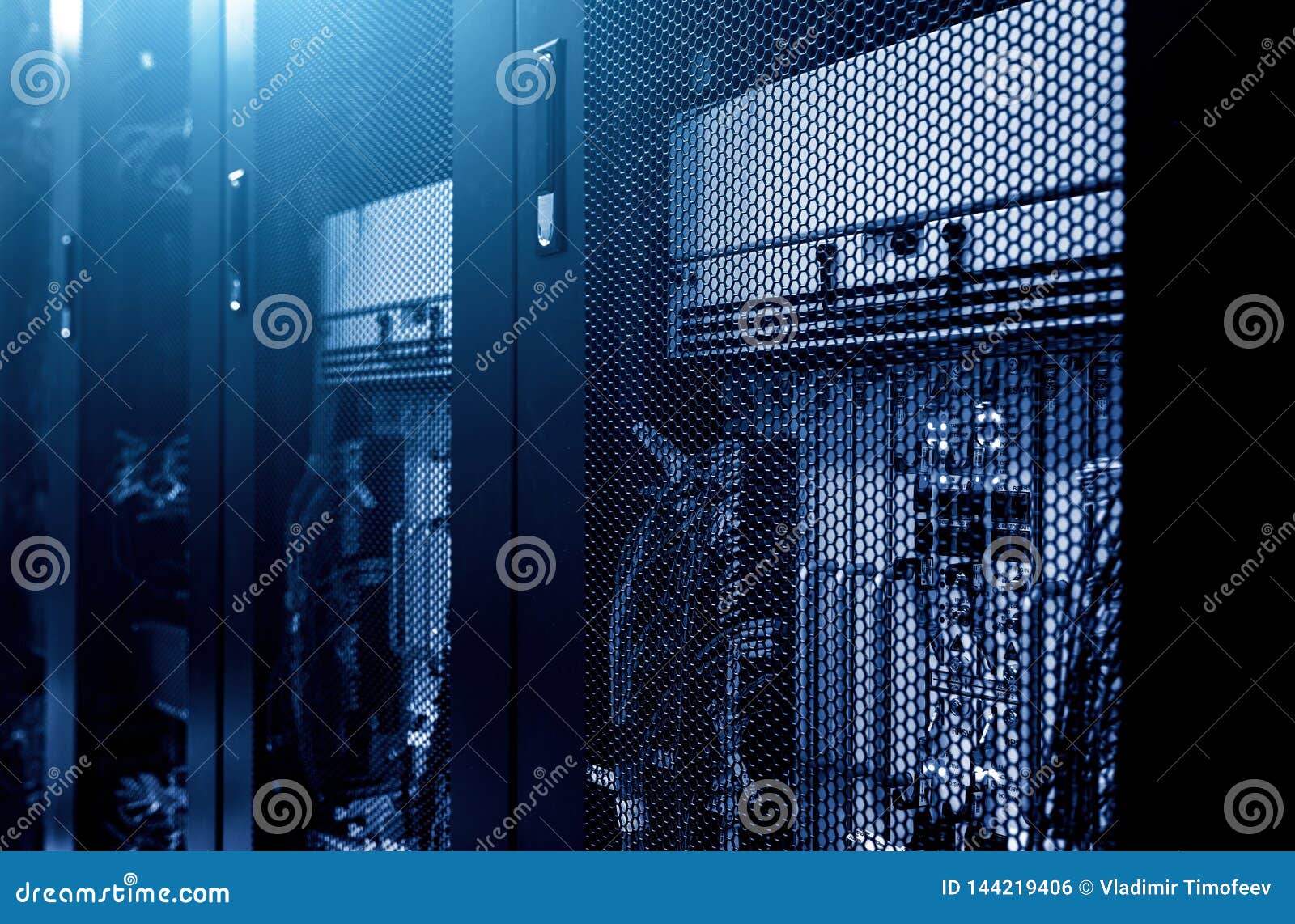 Modern Server Rack Cluster Under Meshed Door in Big Data Centre with ...