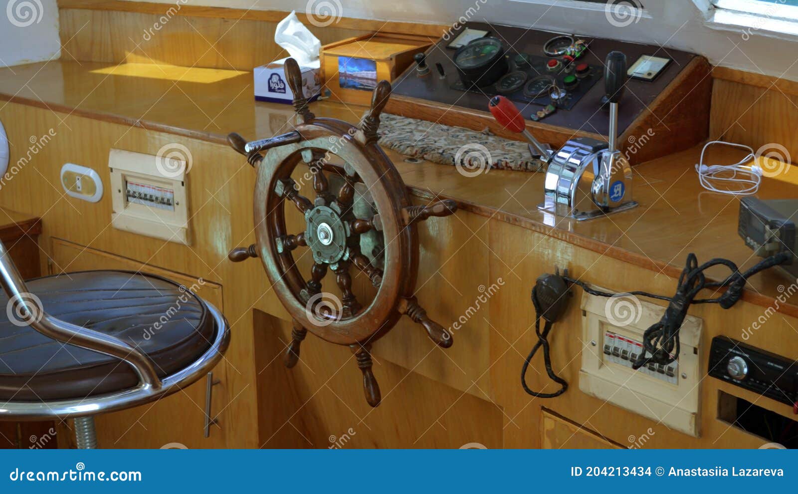 Modern Ship Control Panel with Steering Wheel and Engine Accelerators ...