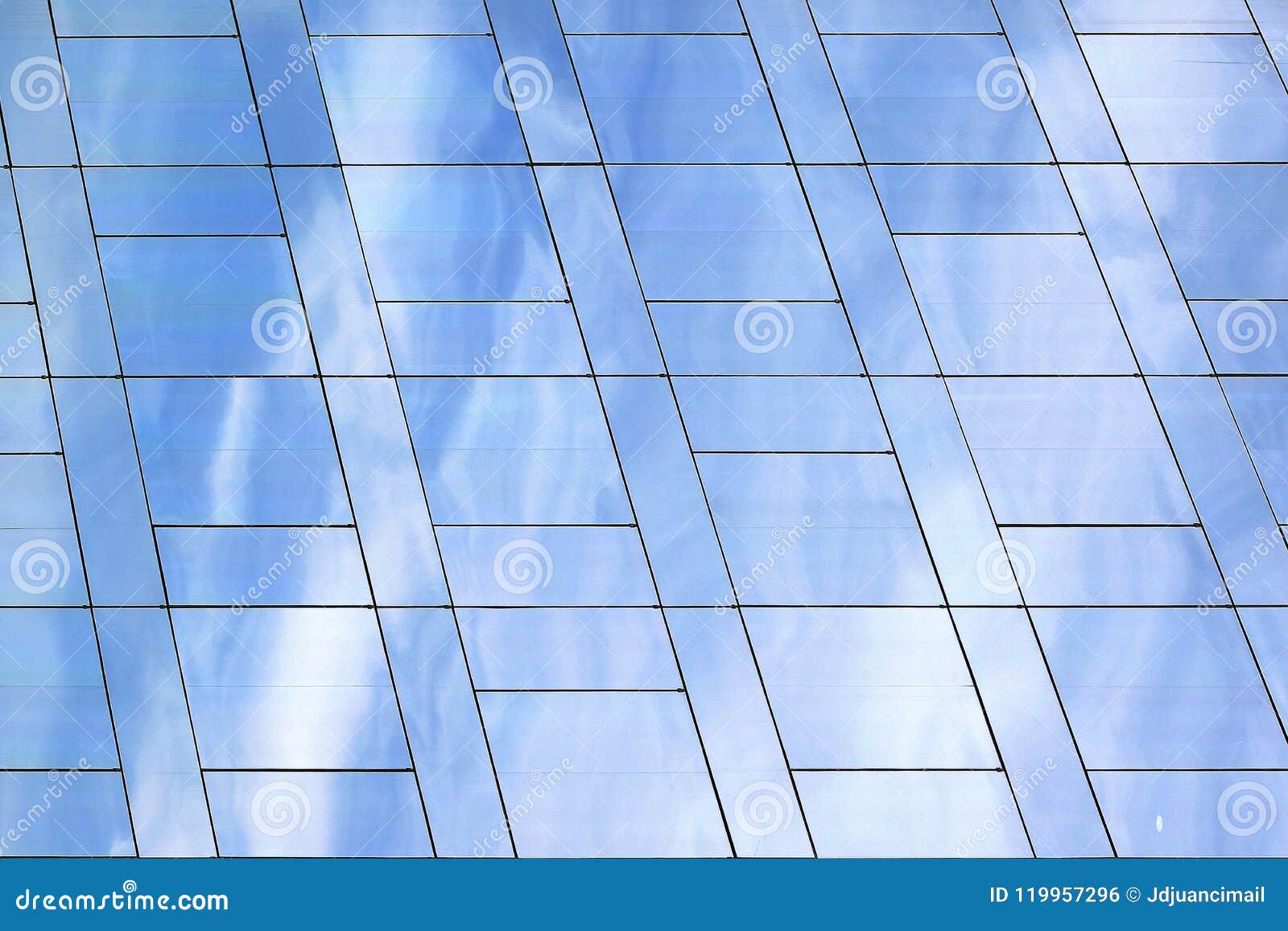 Modern Skyscraper Glass Facade with Clouds Reflection. Textured ...