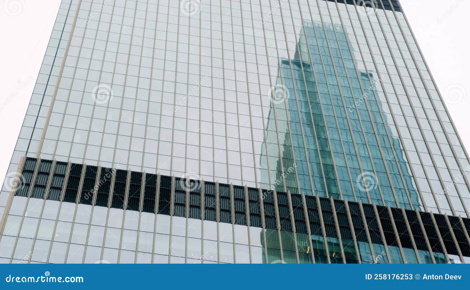 Modern Skyscraper with Glass Windows. from Below of Contemporary Tall ...