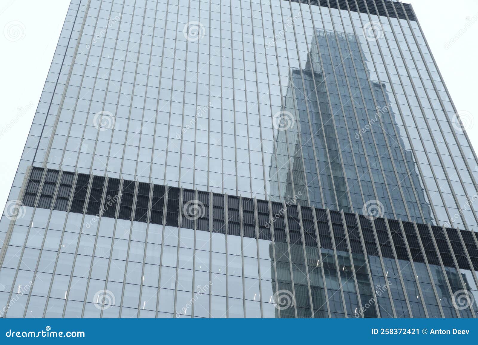 Modern Skyscraper with Glass Windows. from Below of Contemporary Tall ...
