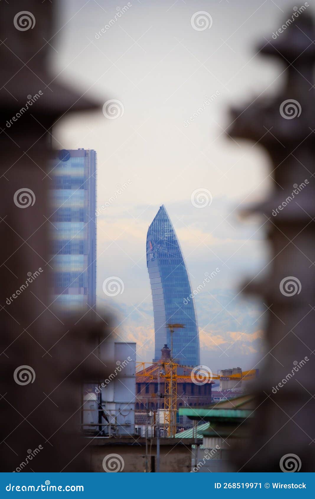 Modern Skyscraper through the Metal Columns at Sunset, Vertical Stock ...