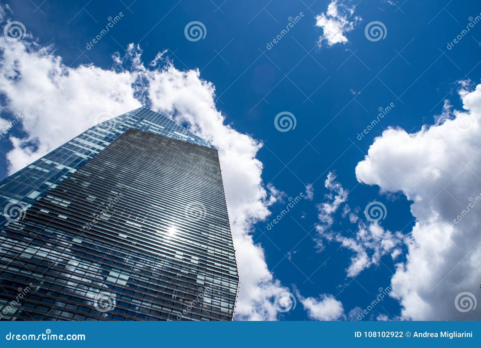 Modern Skyscraper with Reflections of Clouds on Windows Stock Photo ...