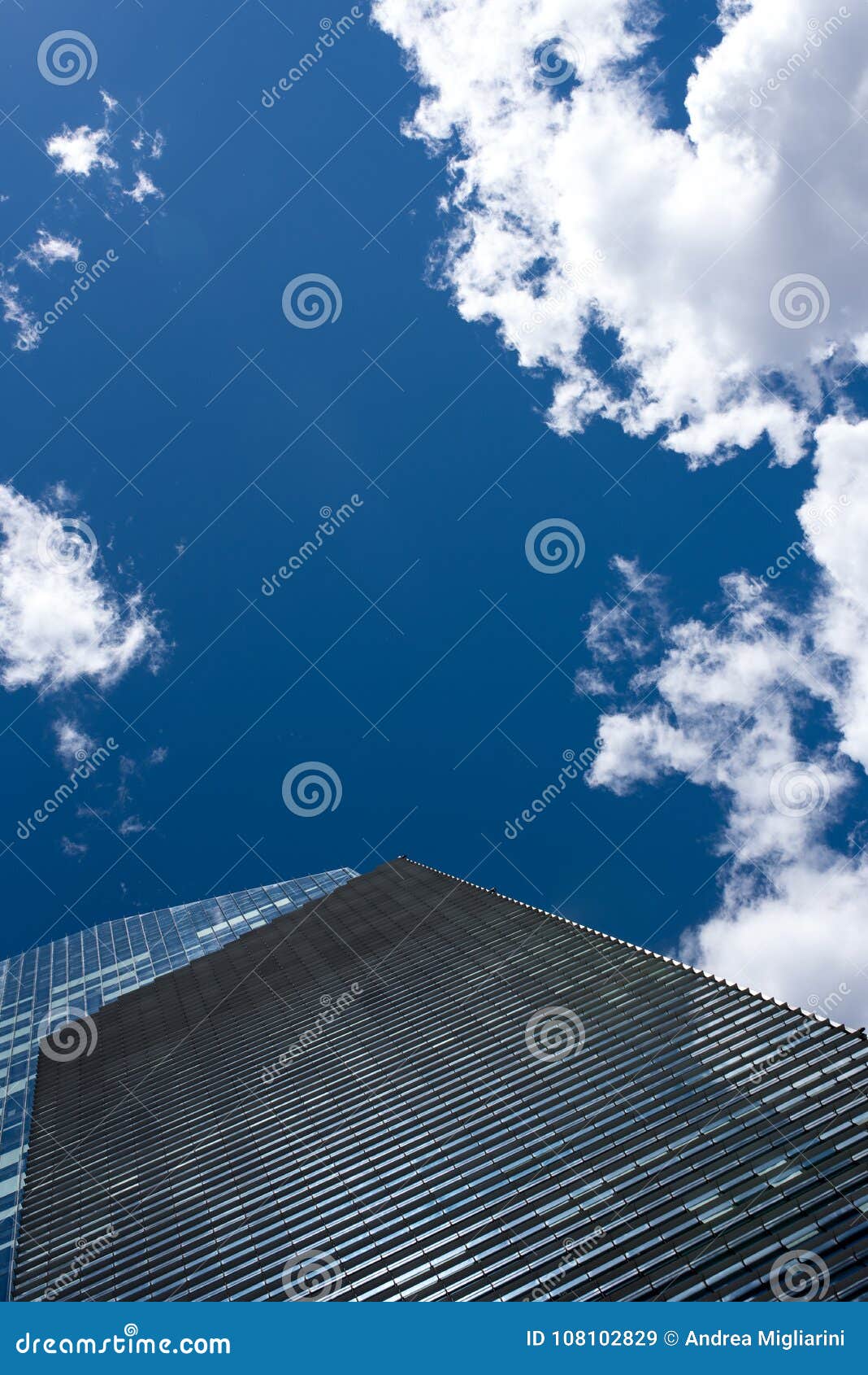 Visionary Skyscraper with Reflections of Clouds on Windows Stock Image ...
