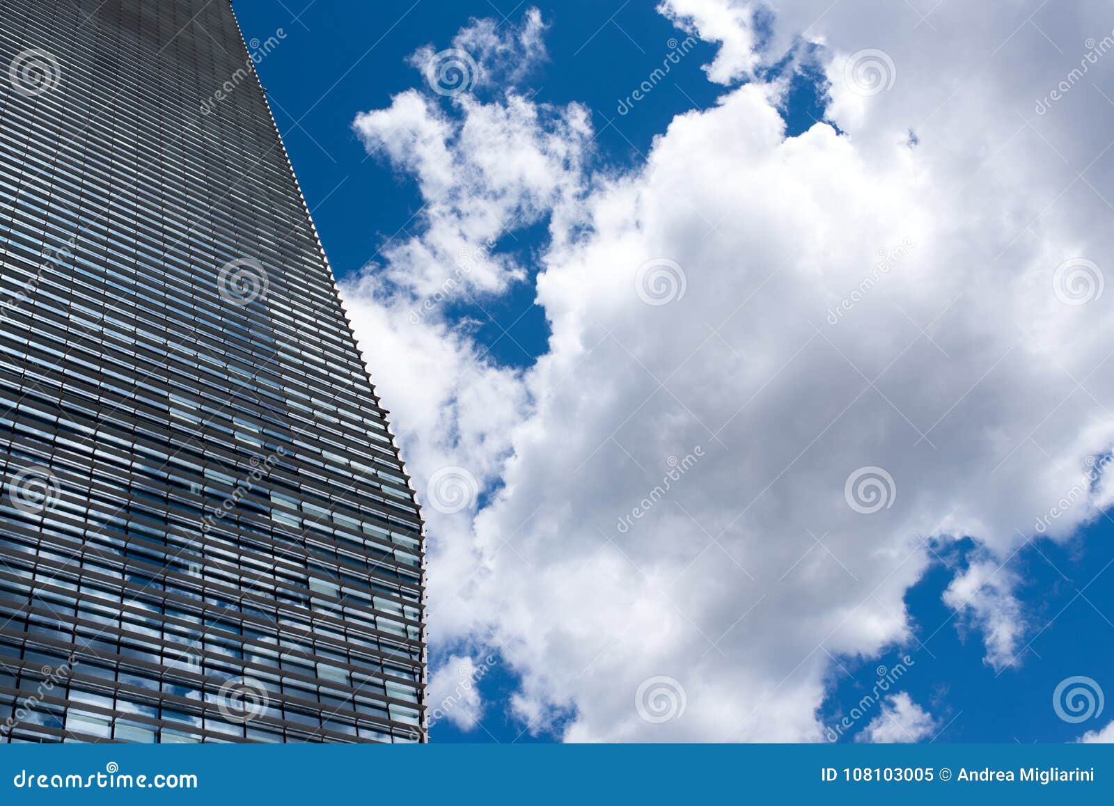 Visionary Skyscraper with Reflections of Clouds on Windows Stock Image ...
