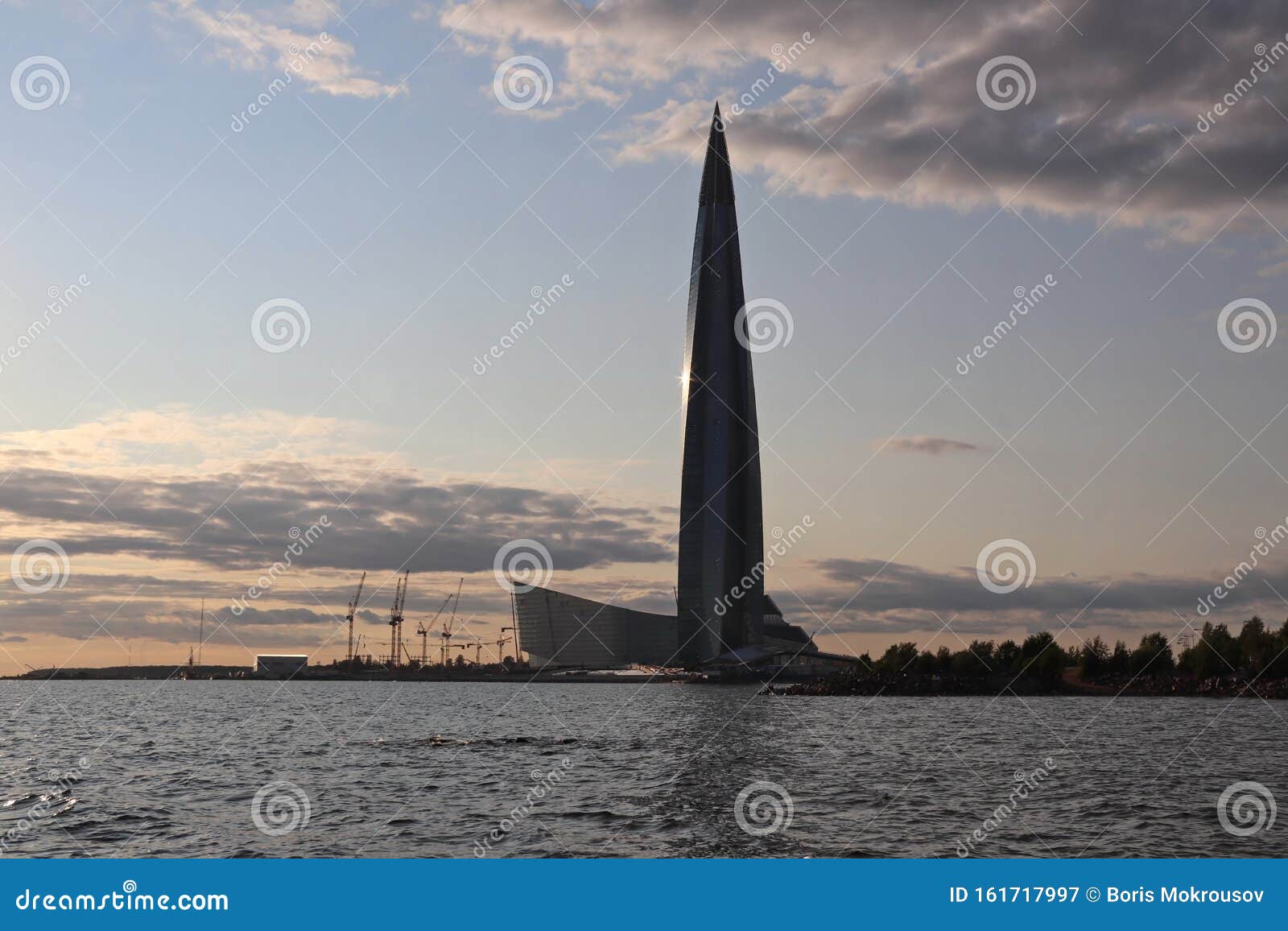 Modern Skyscraper with Sun Flare on the Bay Large Granite Stones Stock ...