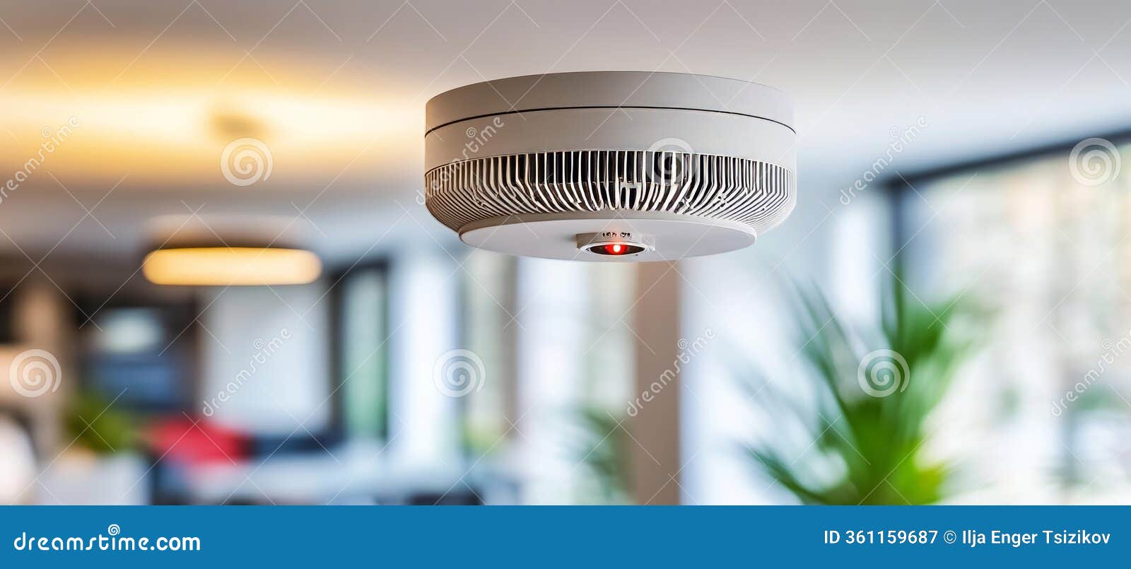 Modern Smoke Detector Installed on a White Ceiling, Ensuring Safety in ...