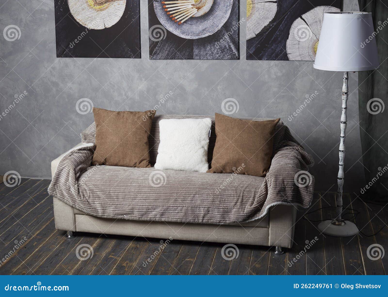 A Modern Sofa in a Gray Style and a Lamp Stands Next To it Stock Image ...