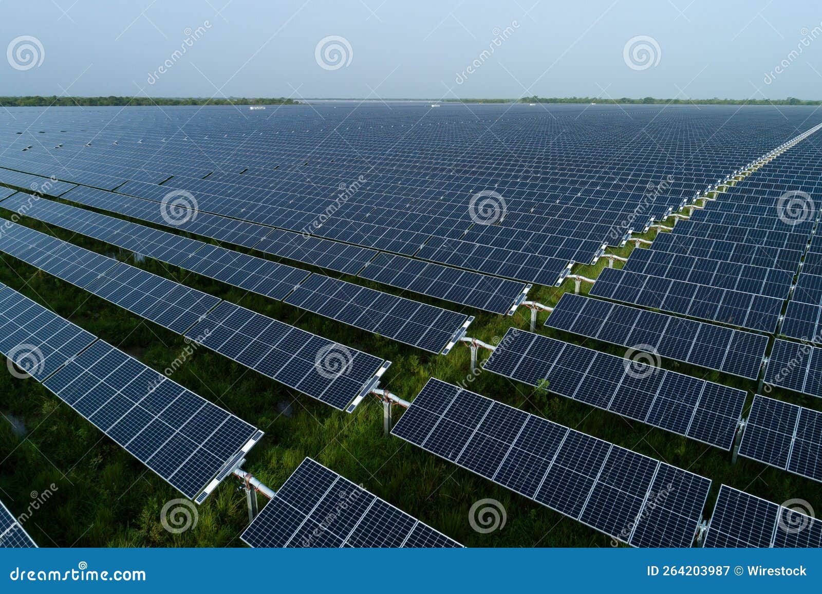 Modern Solar Panels on Grass Fields with Sunset Bright Sky on the ...